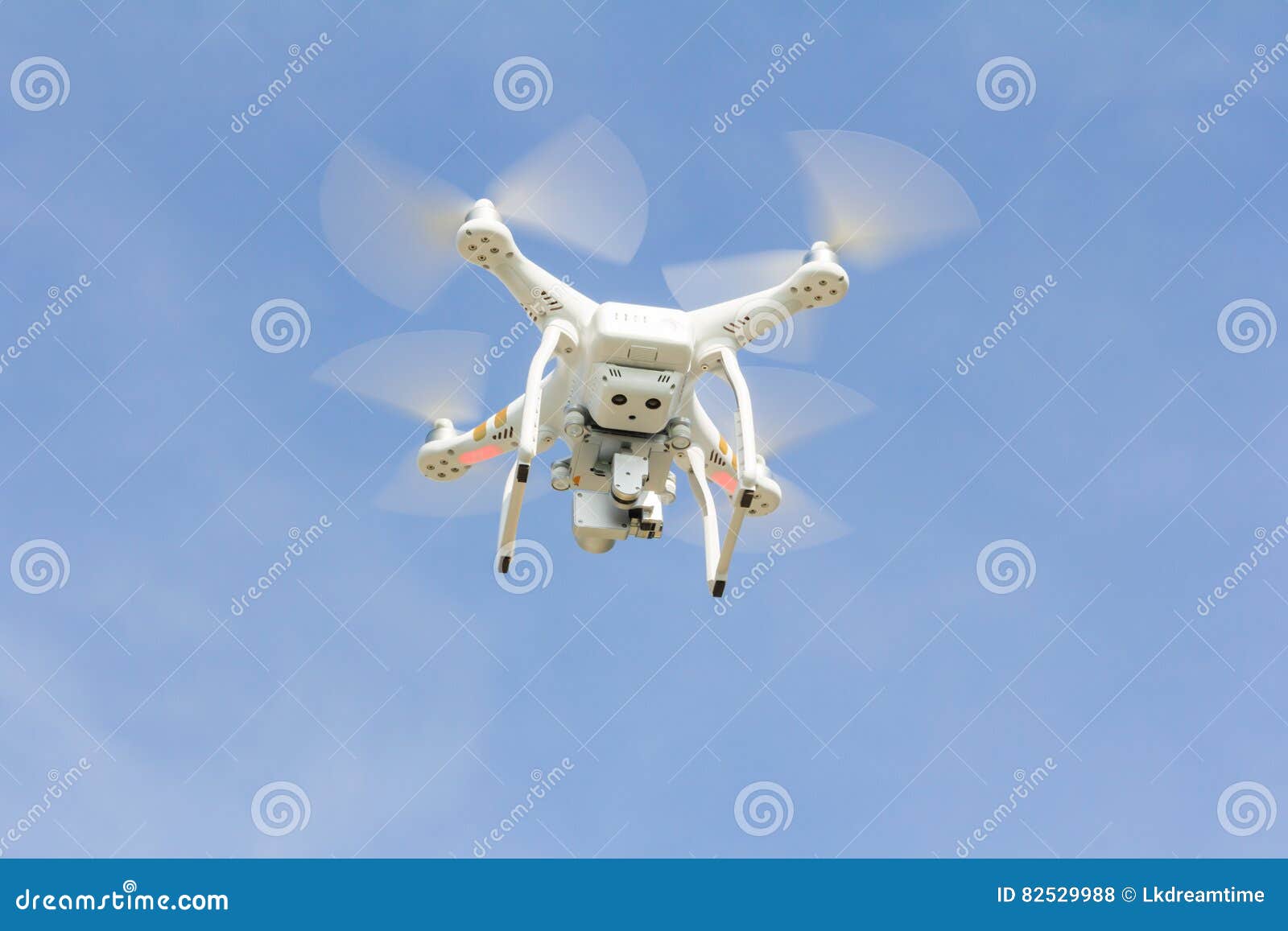 White Drone Hovering in a Bright Blue Sky. Stock Photo - Image of ...