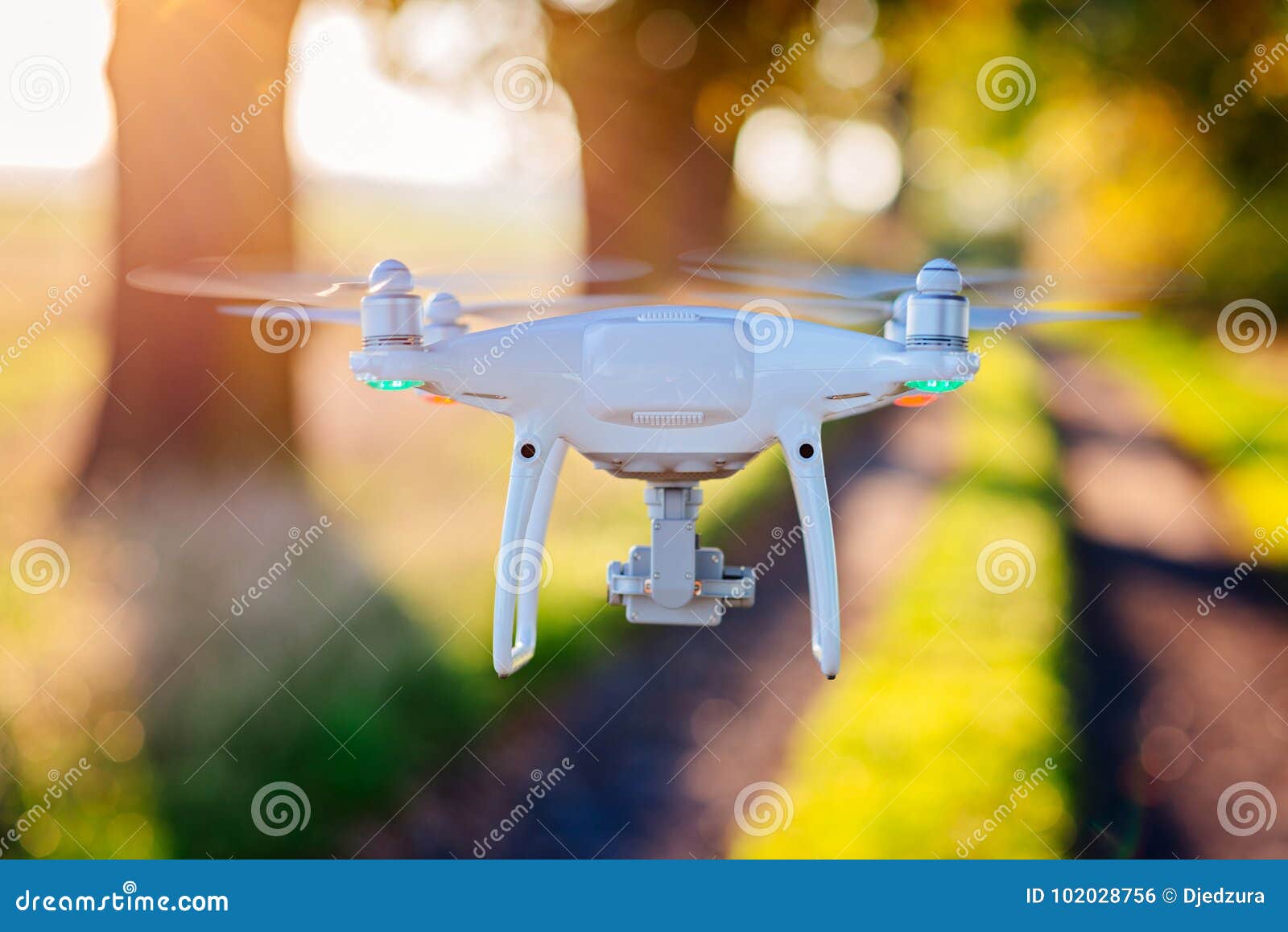 White Drone Quadcopter with Camera I Stock Photo - Image of aerial ...