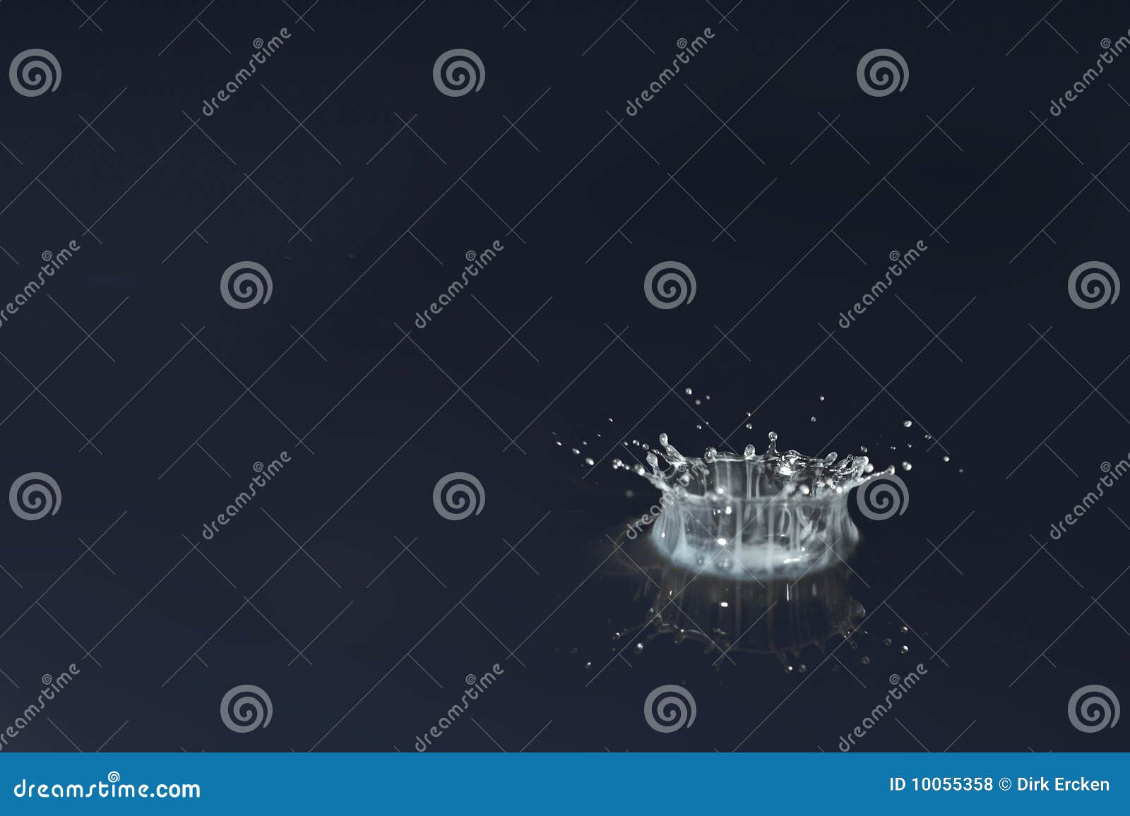 White Droplets Falling into the Blue Stock Photo - Image of droplets ...