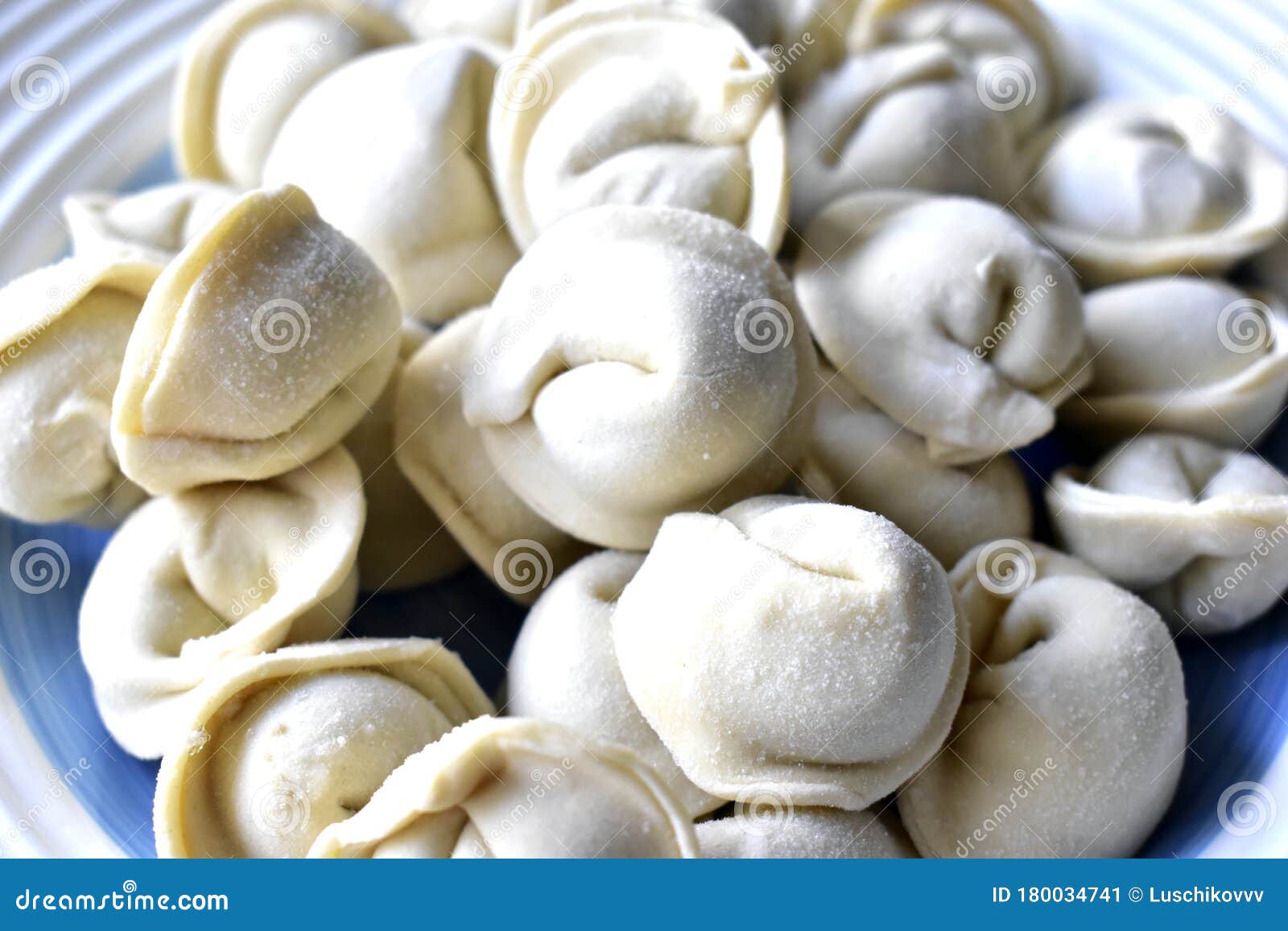 White Dumplings with Meat on a Blue Plate Stock Image - Image of ...