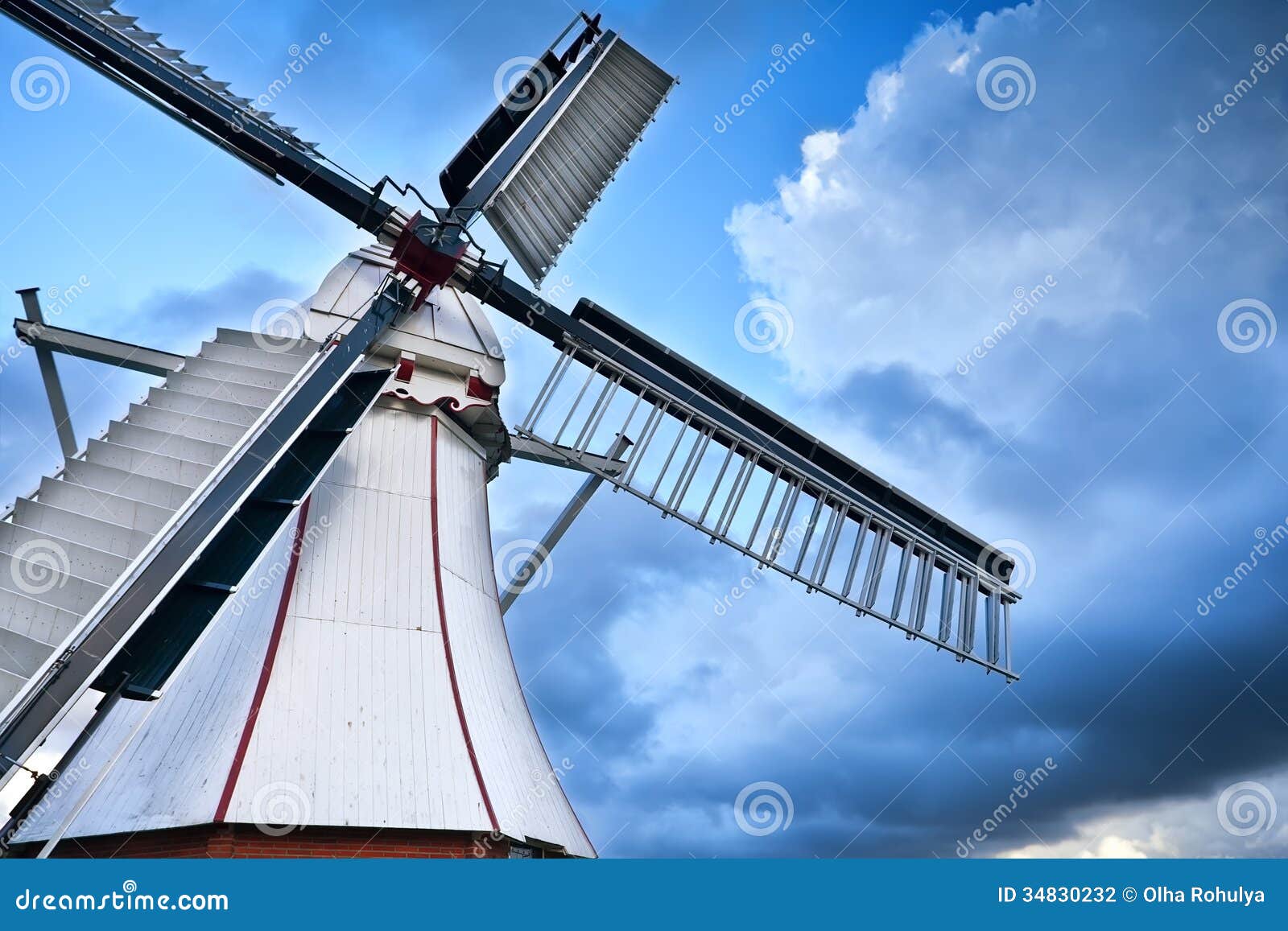 White Dutch Windmill Over Blue Sky Stock Photo - Image of outdoors ...