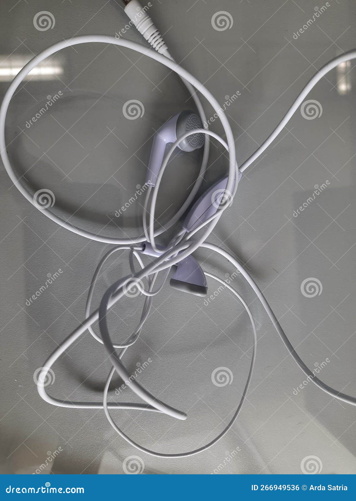 A White Earphone on a Glass Office Table Stock Photo - Image of table ...