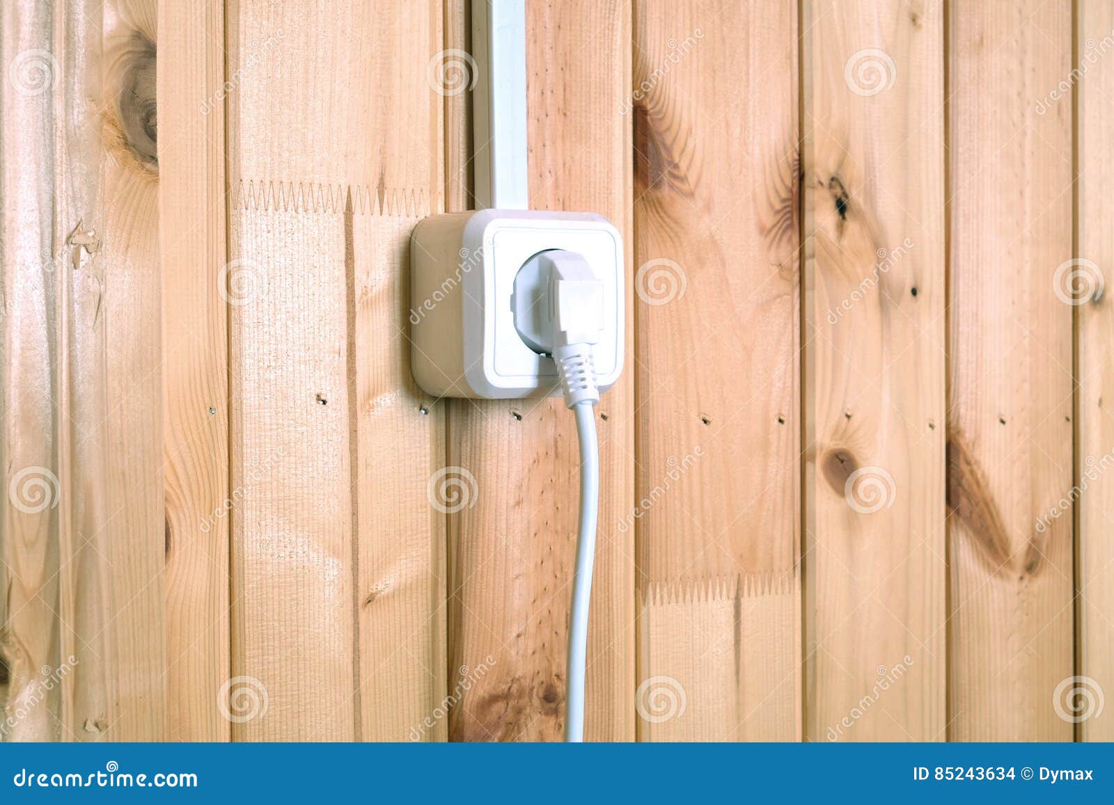 White Electric Plug in Socket on Wooden Wall with Vertical Planks Stock ...