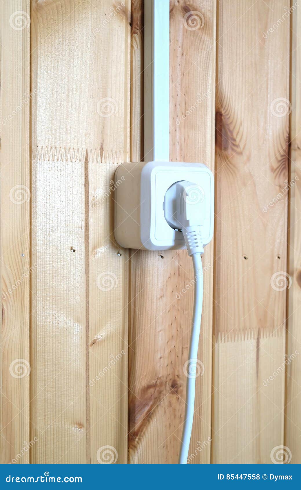 White Electric Plug in Socket on Wooden Wall with Vertical Planks Stock ...
