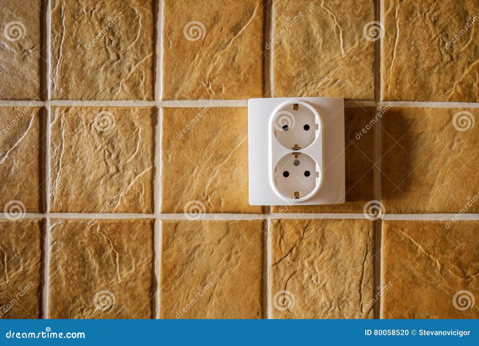 White Electric Socket on Kitchen Wall with Ceramic Tiles Stock Photo ...