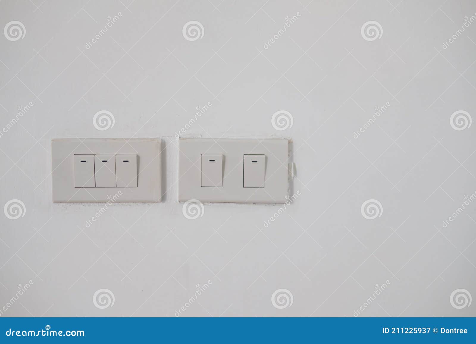White Electric Turn on and Off Switch on White Wall Stock Image - Image ...