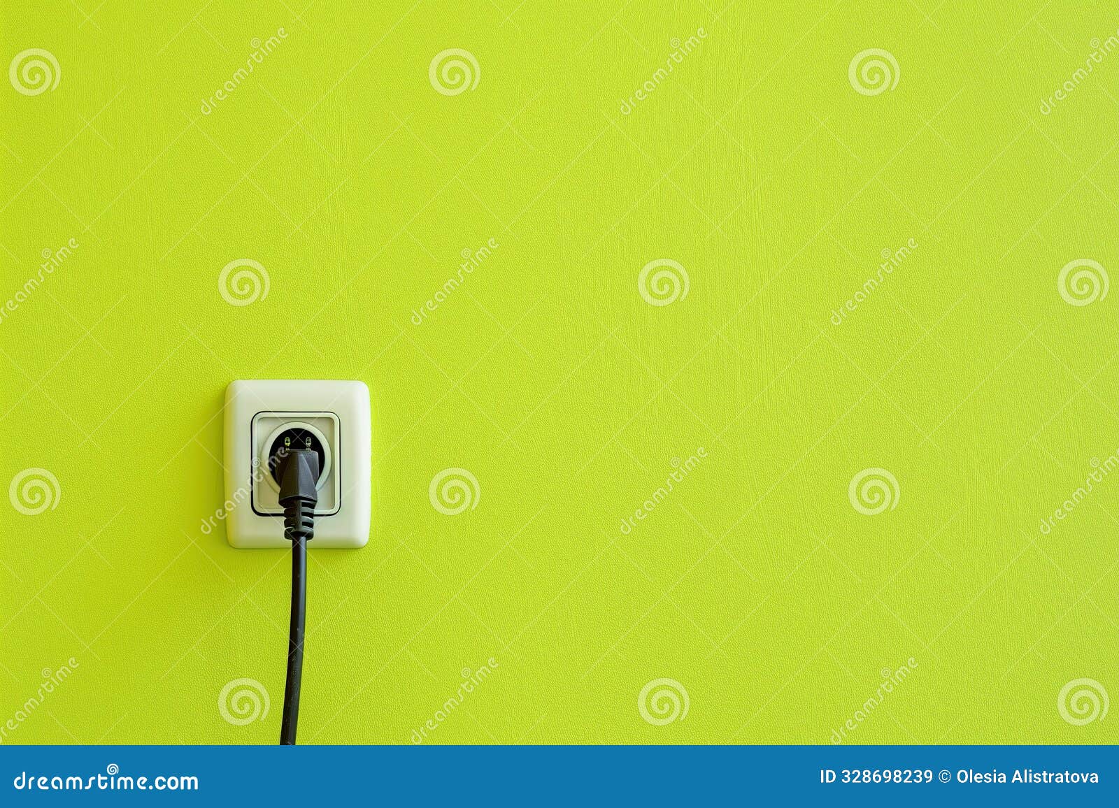 Electrical Plug and Socket on Green Wall Background with Copy Space ...