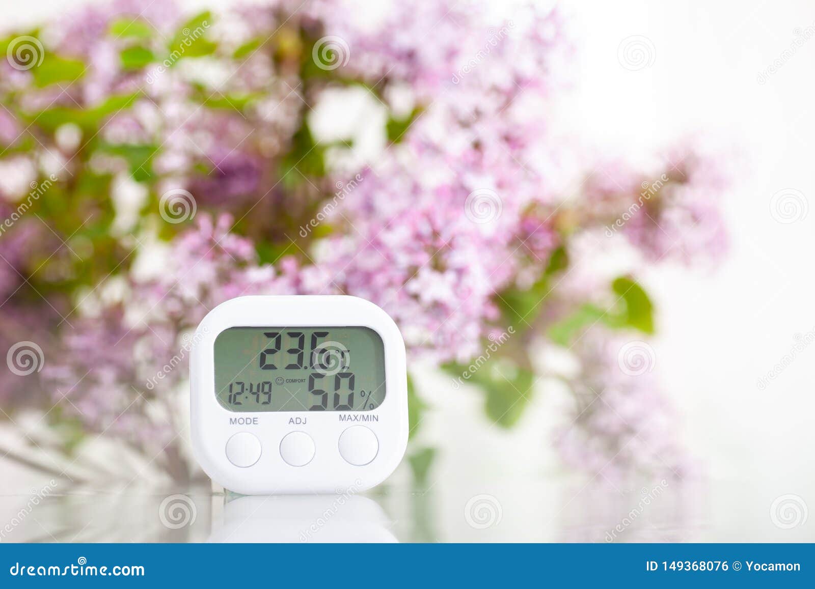 White Electronic Hygrometer on White Table Stock Photo - Image of ...
