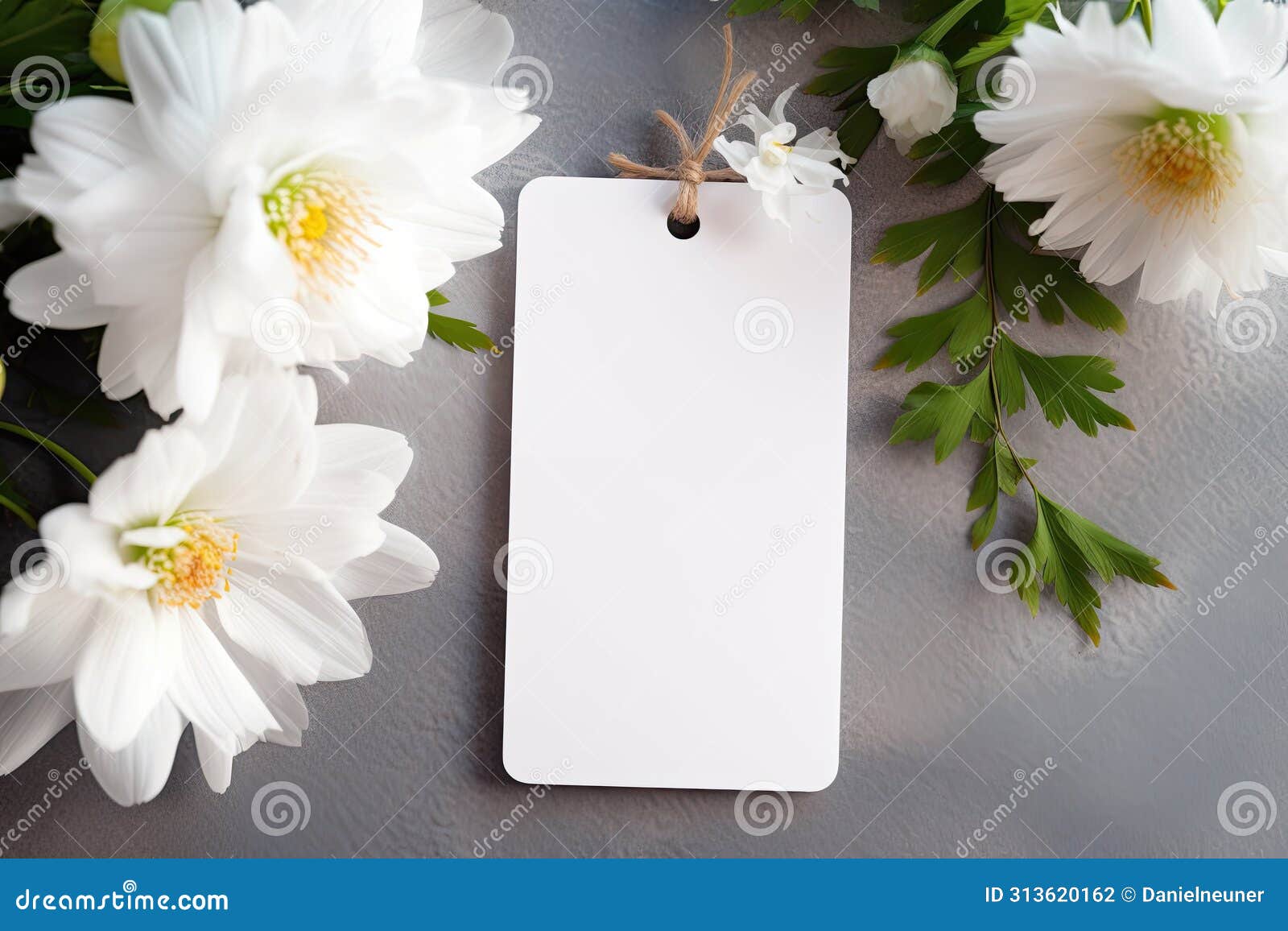 A White Empty Blank Gift Tag Label Next To White Flowers Stock ...