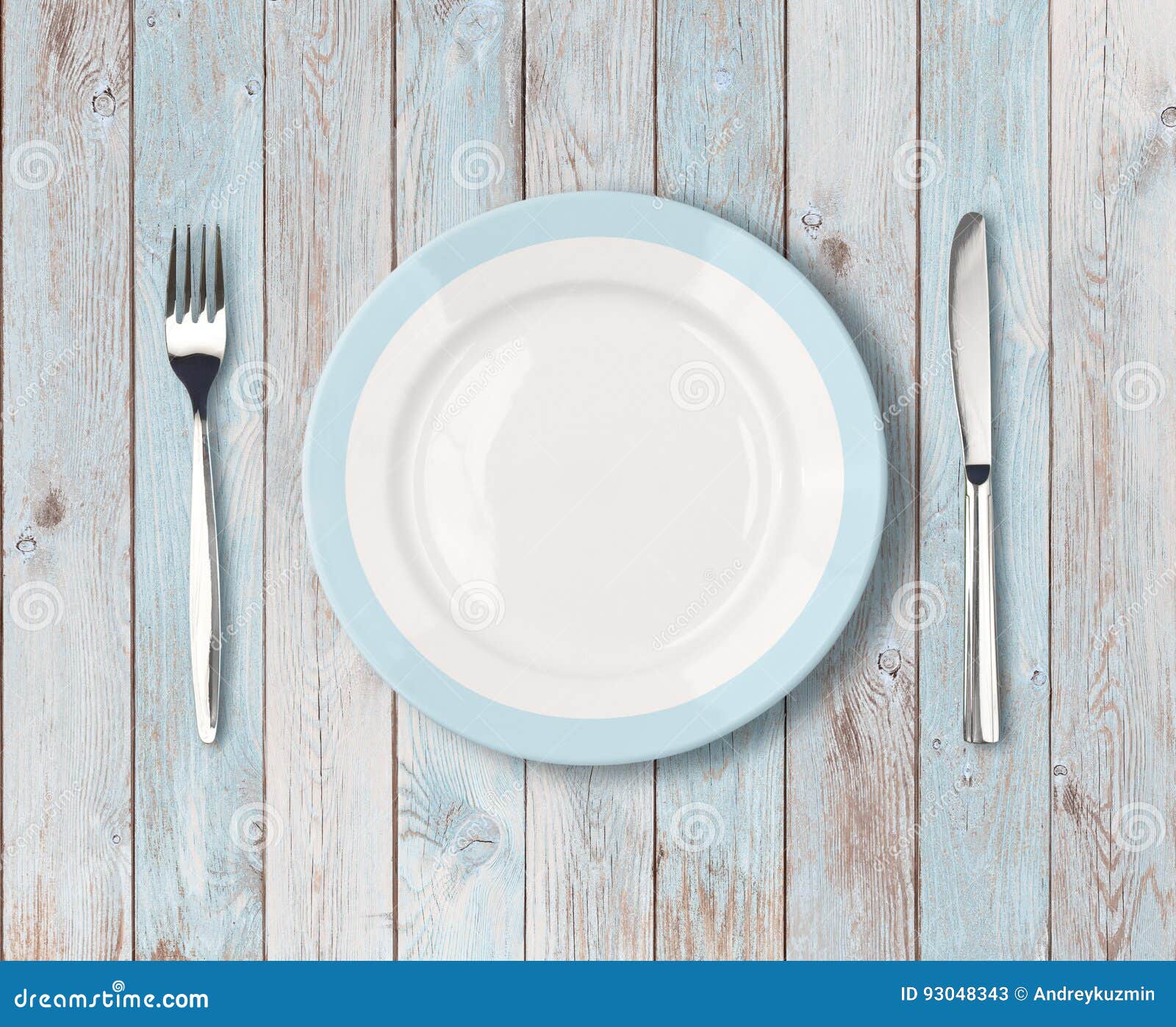 White Empty Dinner Plate with Blue Border on Wooden Table Stock Image ...