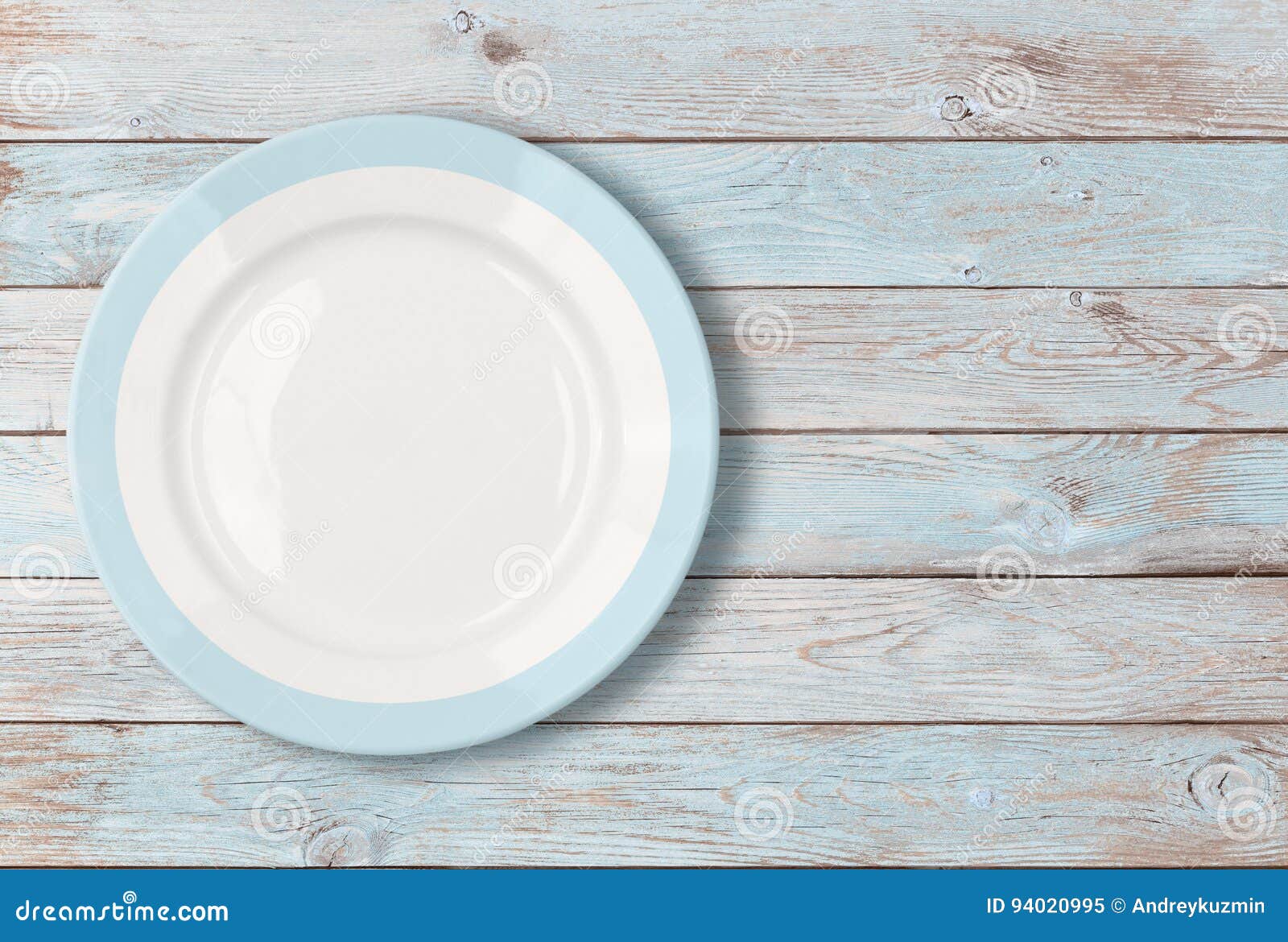 White Empty Dinner Plate with Blue Border on Wooden Table Stock Image ...