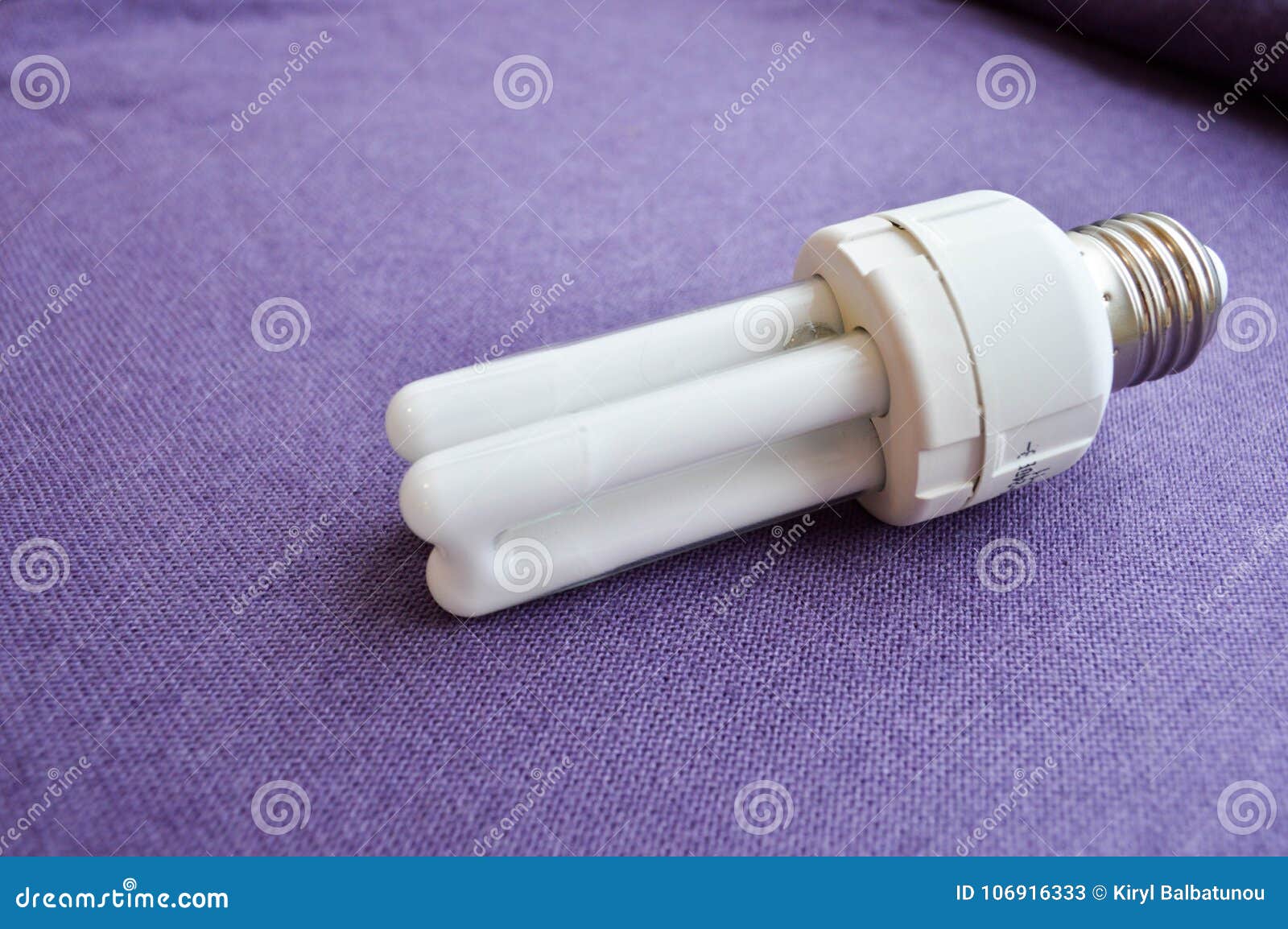 White Energy-saving Fluorescent Light Bulb with Four Tubes, with a ... White Energy-saving Fluorescent Light Bulb with Four Tubes, with a ...