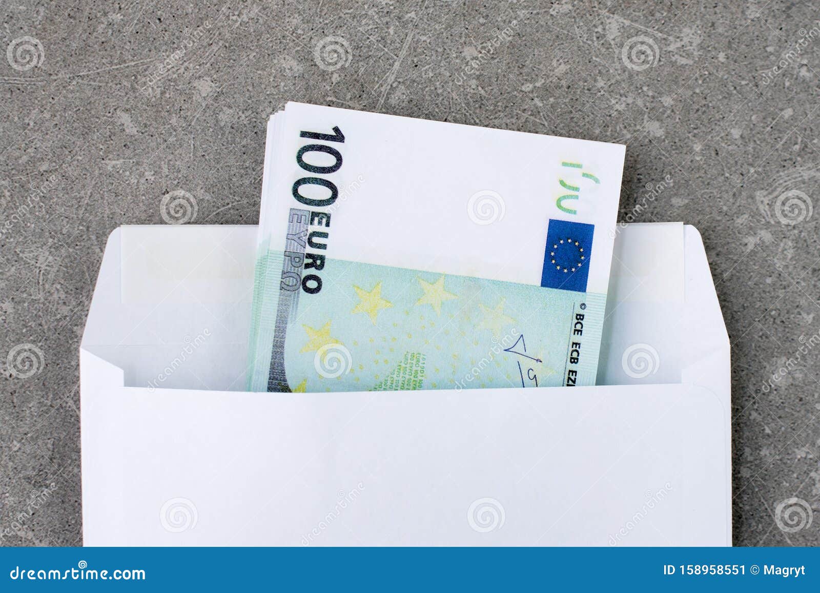 White Envelope with a 100 Euro Bills. Stack of One Hundred Euro Notes ...