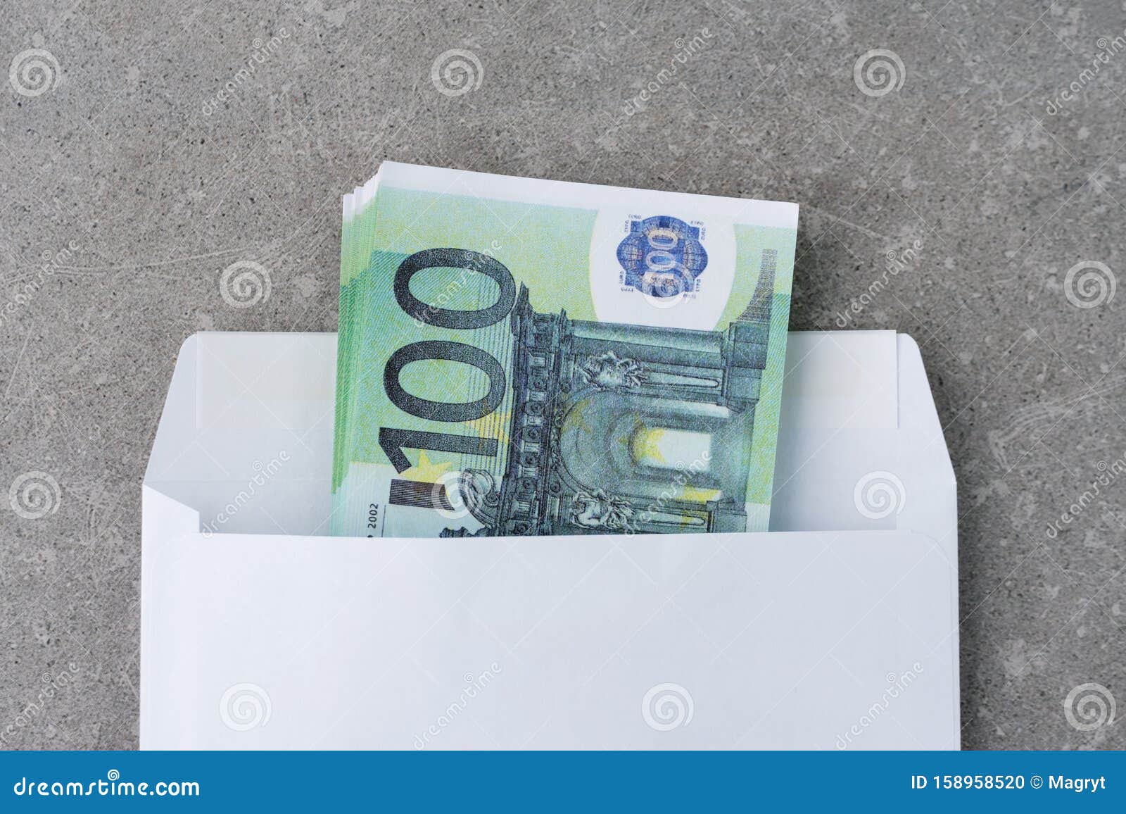 White Envelope with a 100 Euro Bills. Stack of One Hundred Euro Notes ...