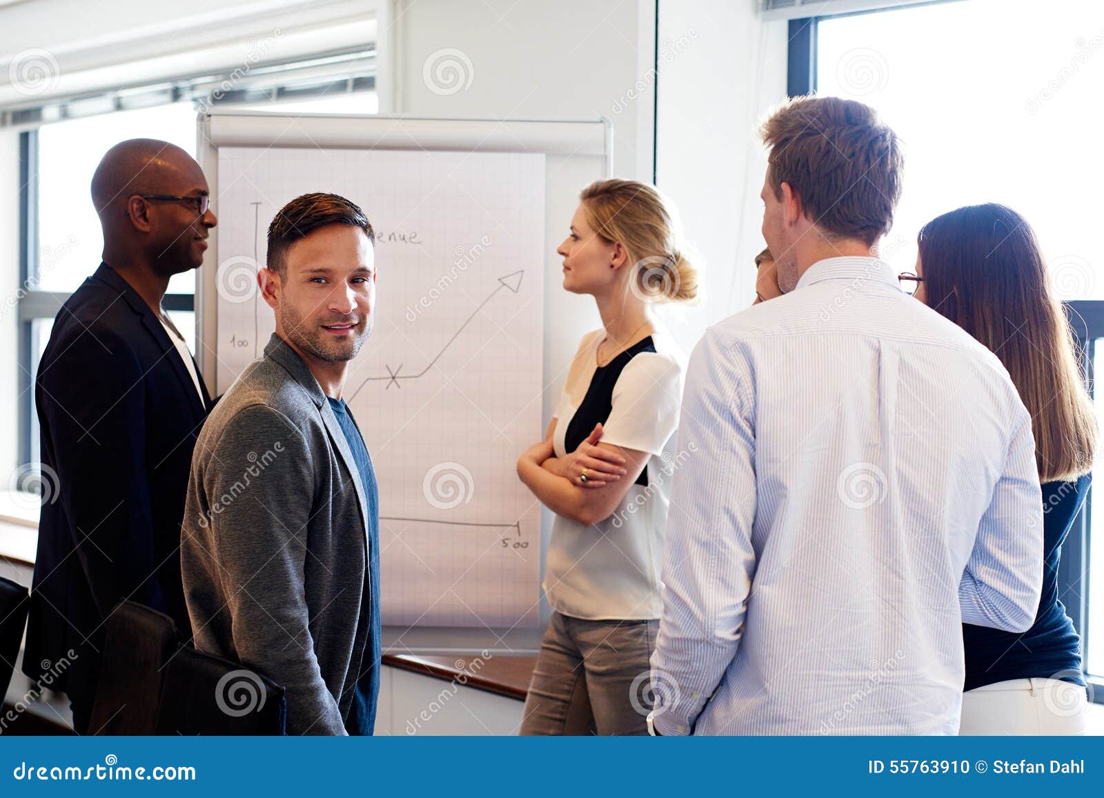 White Executive Smiling at Camera during Work Presentation Stock Photo ...