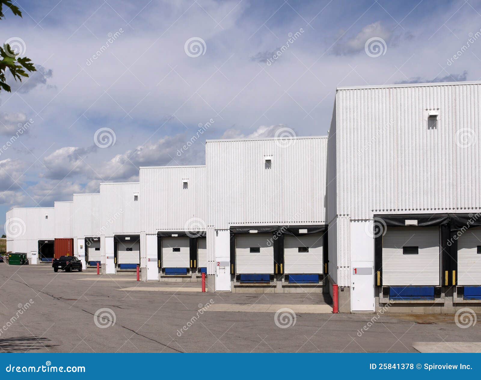 White Factory And Loading Dock Stock Photo - Image of overhead, garage ...