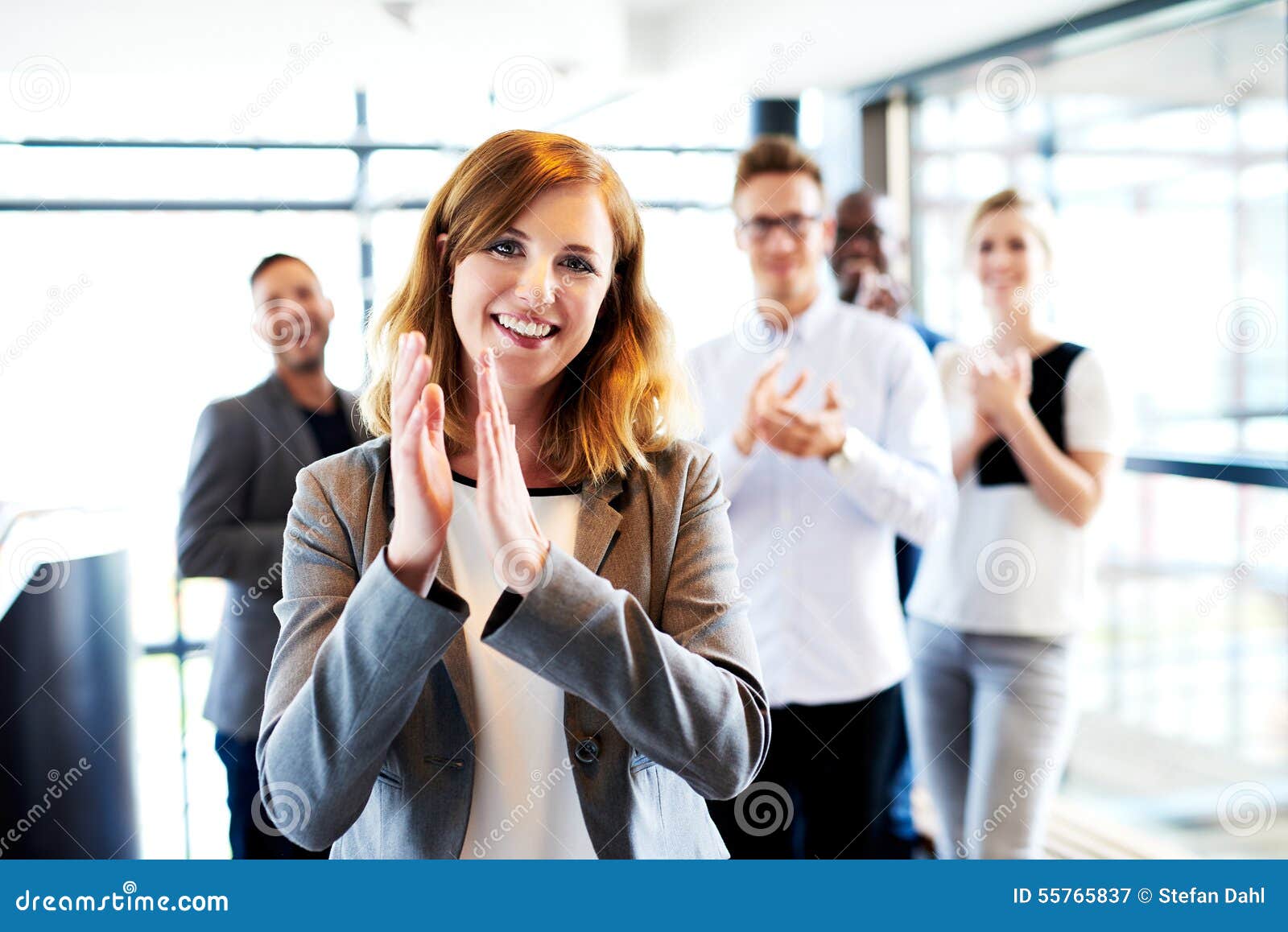 Colleagues Clapping After Presentation At Creative Office Royalty-Free ...
