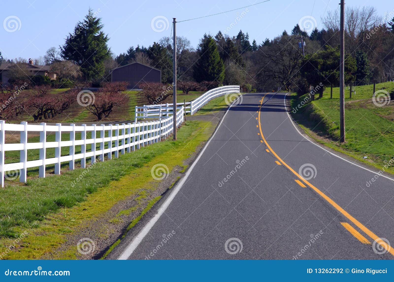 White fences & road. stock photo. Image of exploration - 13262292