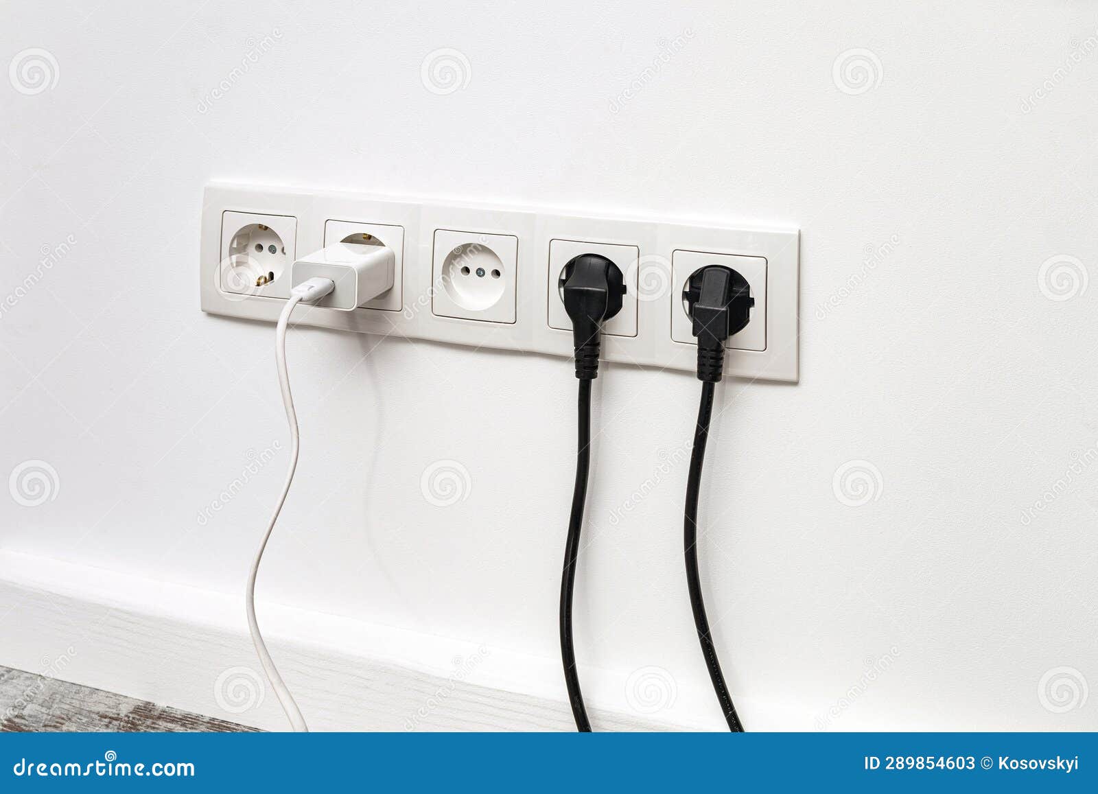White Five-way Wall Power Socket on White Wall Stock Image - Image of ...