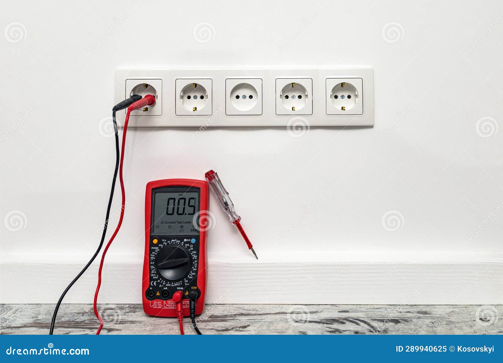 Checking the Voltage of Electricity at a Home Outlet Stock Image ...