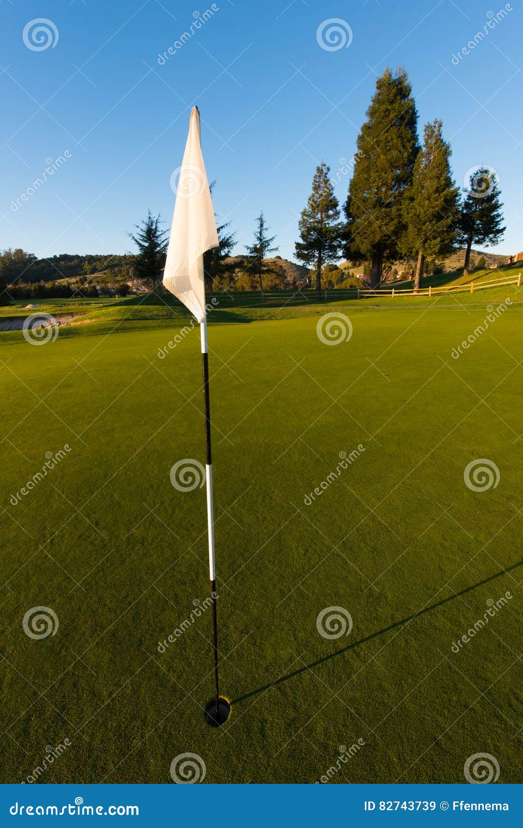 White Flag with a Stripped Pin on Golf Green Stock Image - Image of ...