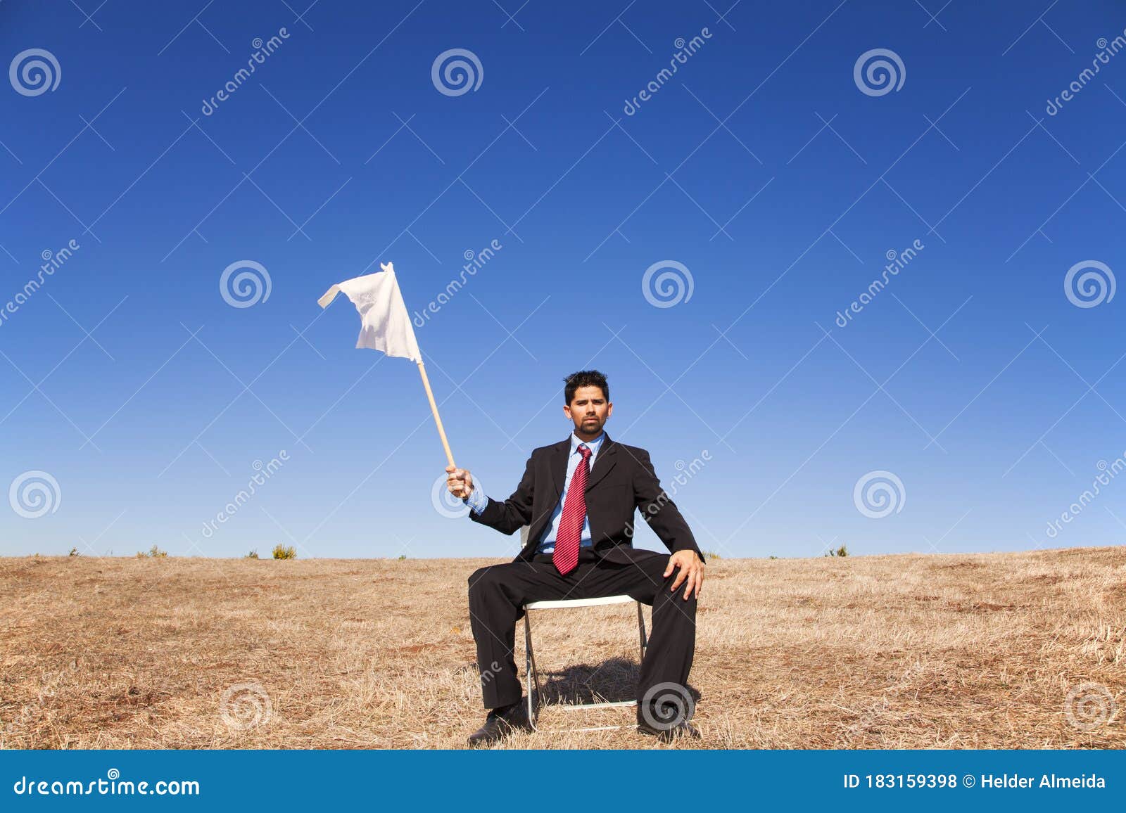 White flag for surrender stock photo. Image of flag - 183159398