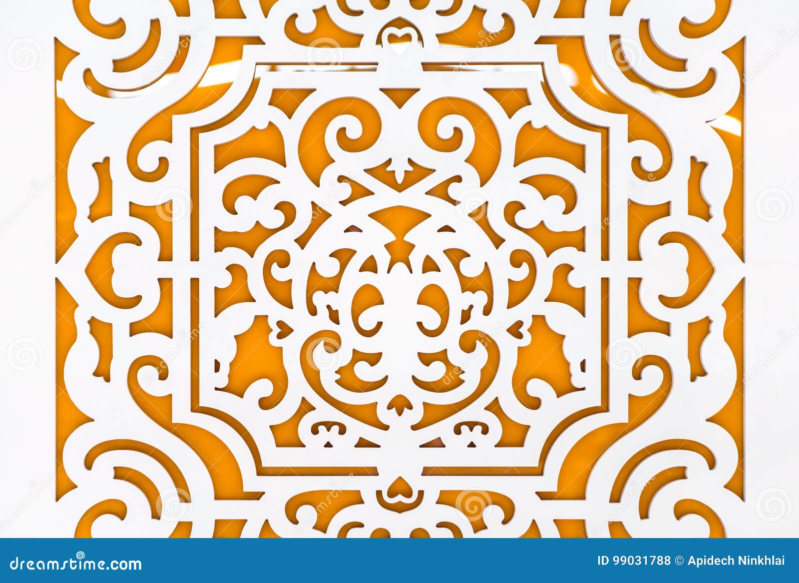 White Floral Perforated Design on Orange Board Stock Photo - Image of ...