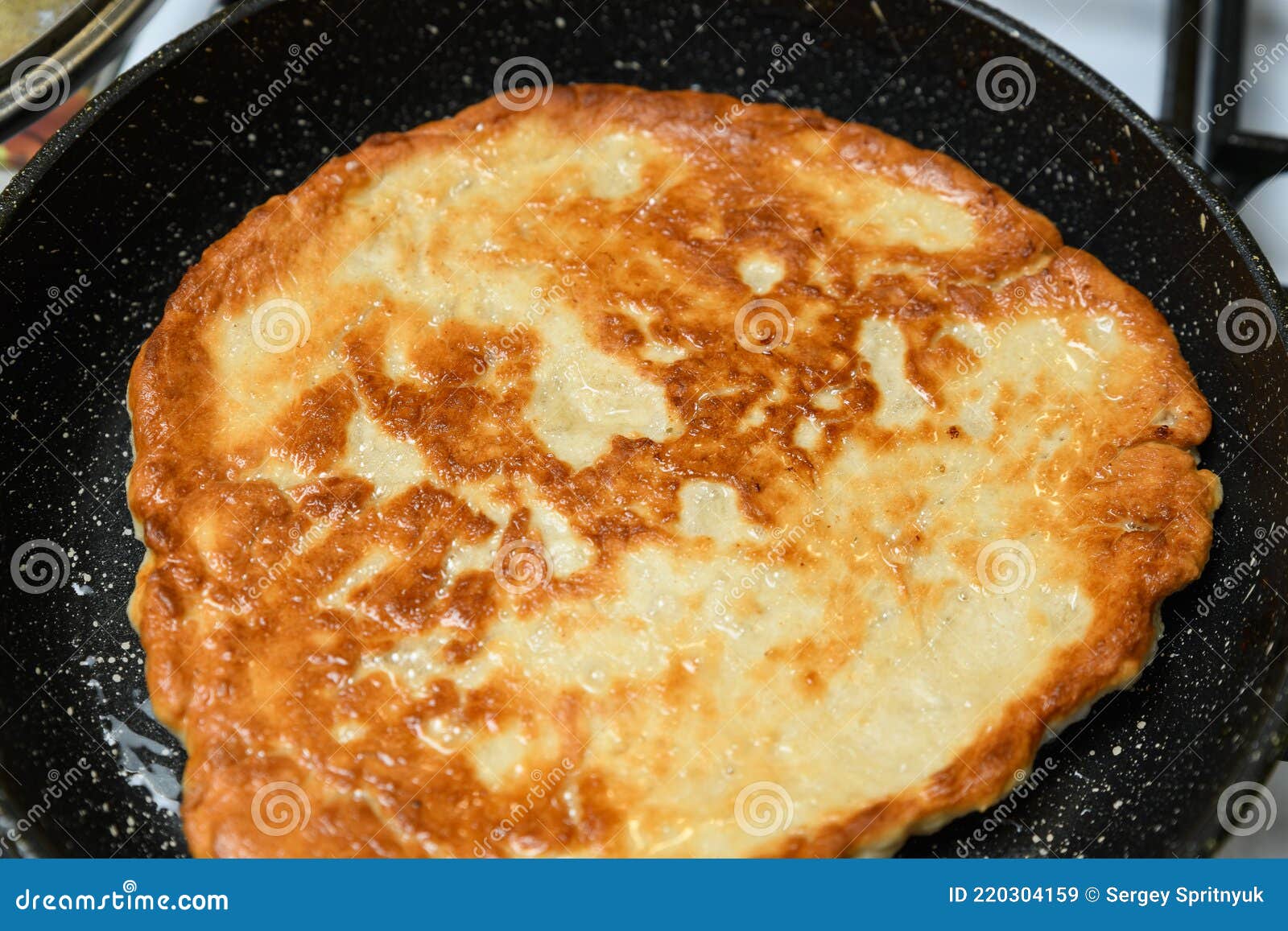 White Flour Bread Tortilla in a Frying Pan Stock Image - Image of ...