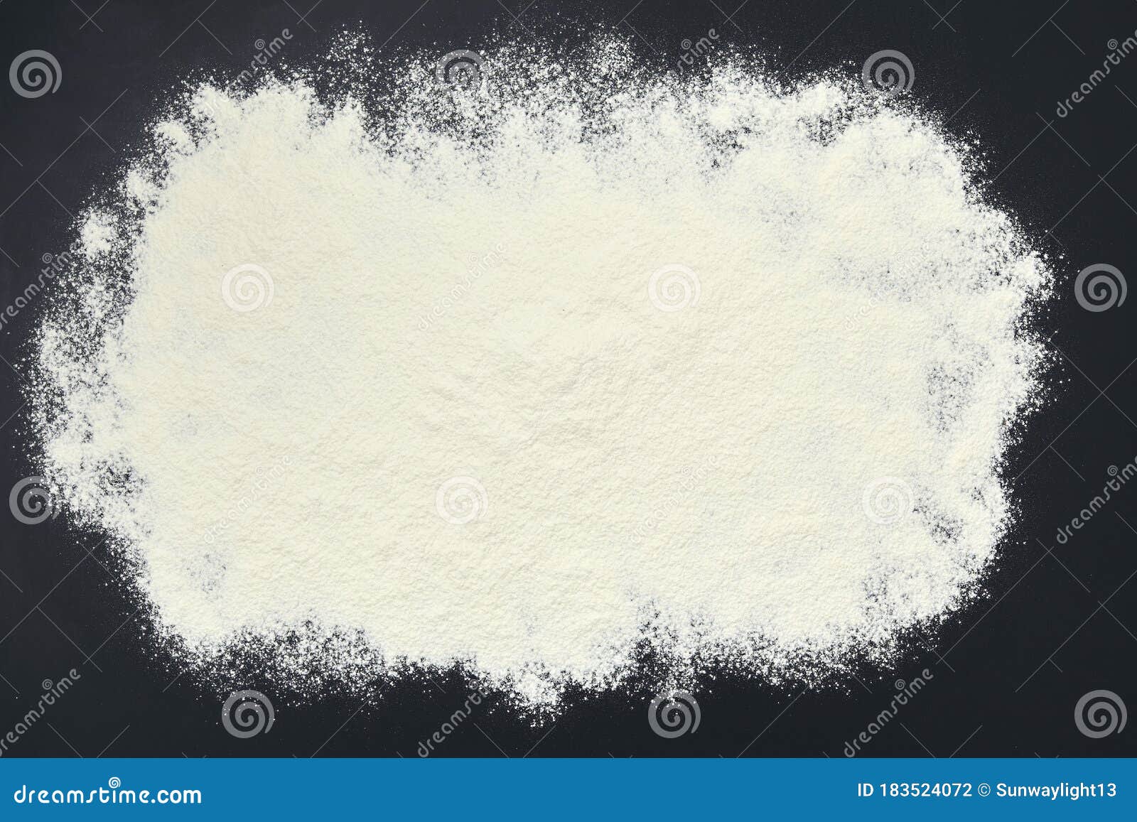 White Flour Sprinkled on a Dark Wooden Table. Top View Stock Photo ...