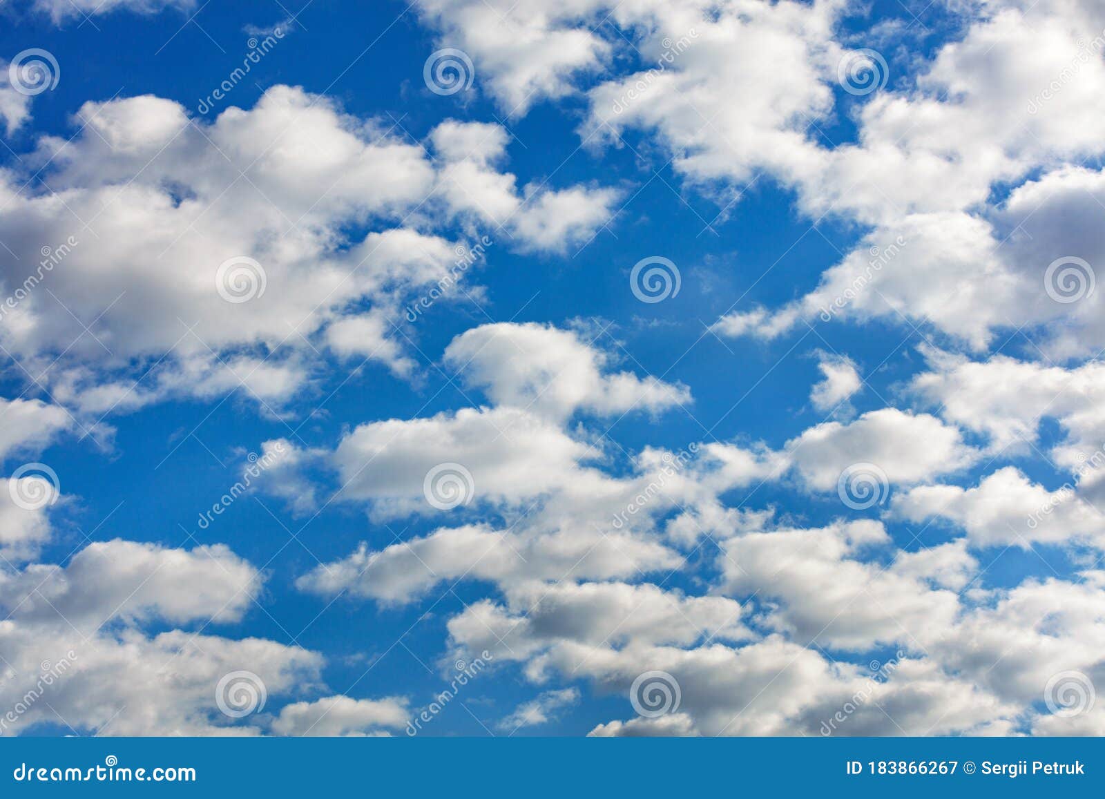White Clouds in Backlight Against a Blue Sky Stock Image - Image of ...