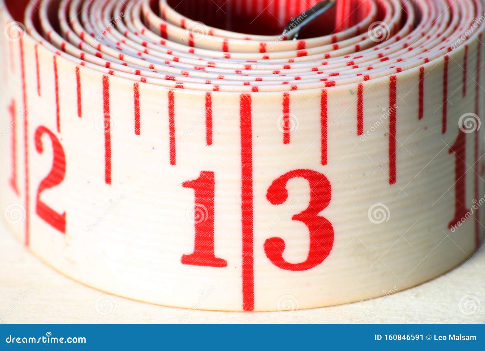 A White Rolled Measuring Tape Showing Centimeters Stock Image - Image ...