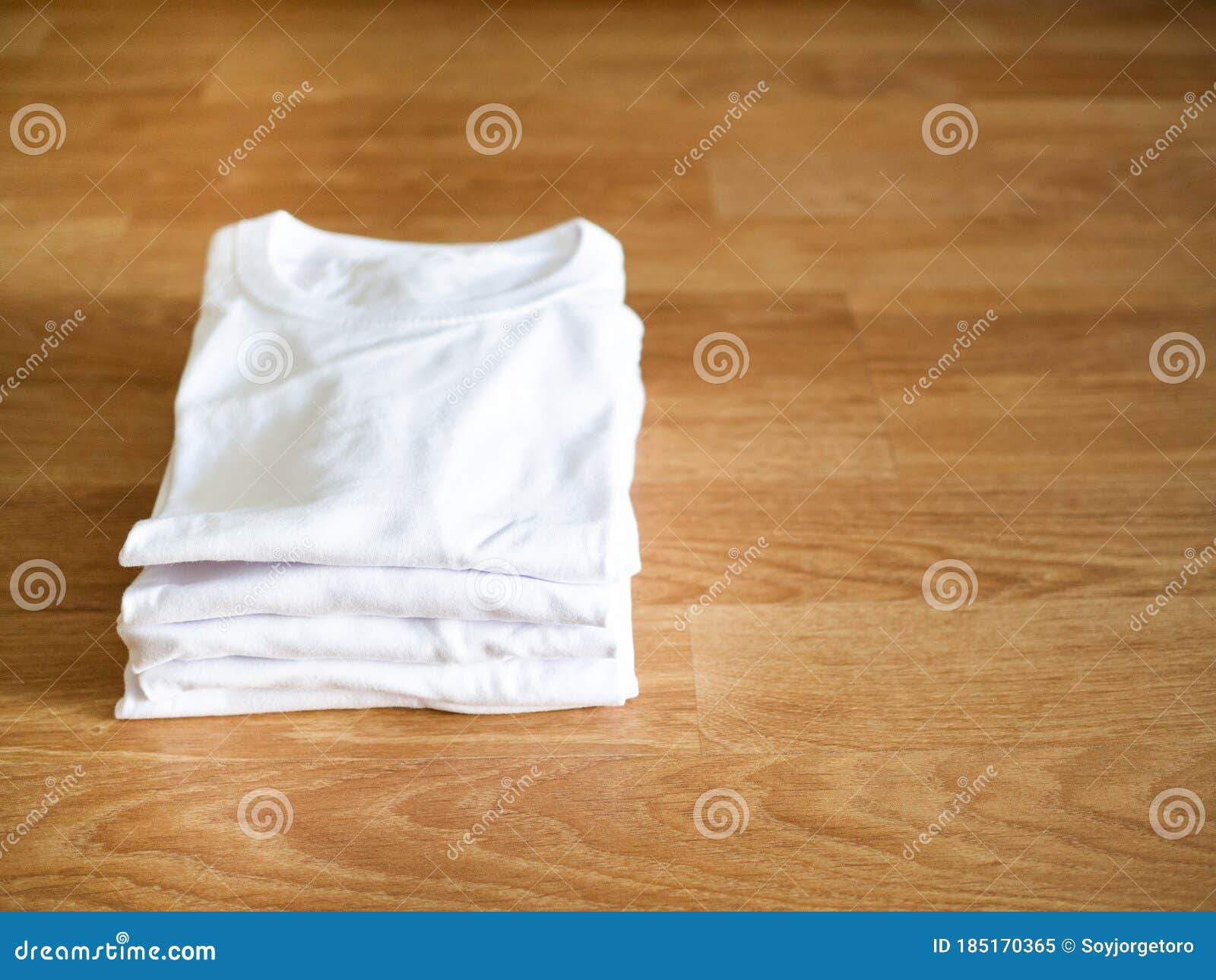 White folded T-shirt stack stock image. Image of folded - 185170365