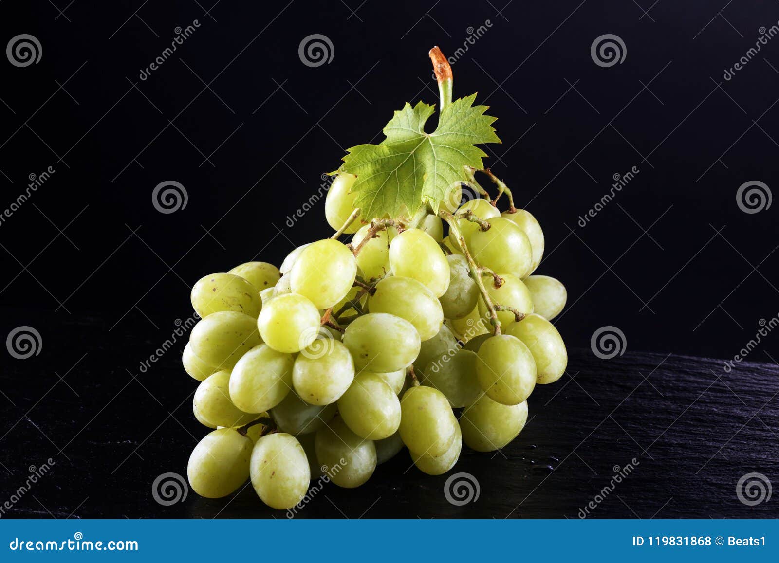 White Fresh Grapevine on Dark Stone Table. Stock Photo - Image of ...