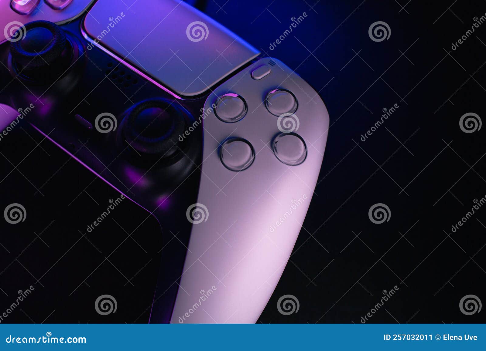 Next Gen Game Controller with Color Lights on Dark Background. Stock ...