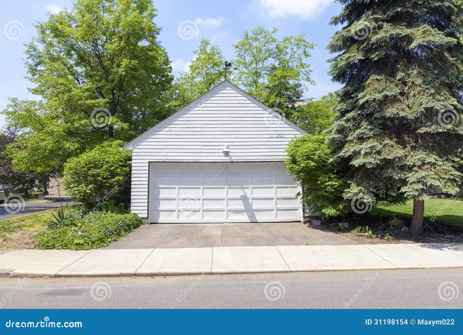 White Garage stock photo. Image of clouds, door, front - 31198154