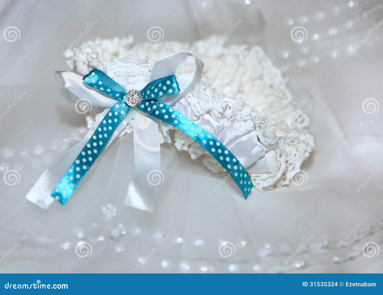 White Garter with Blue Ribbon and Diamante Stock Photo - Image of white ...