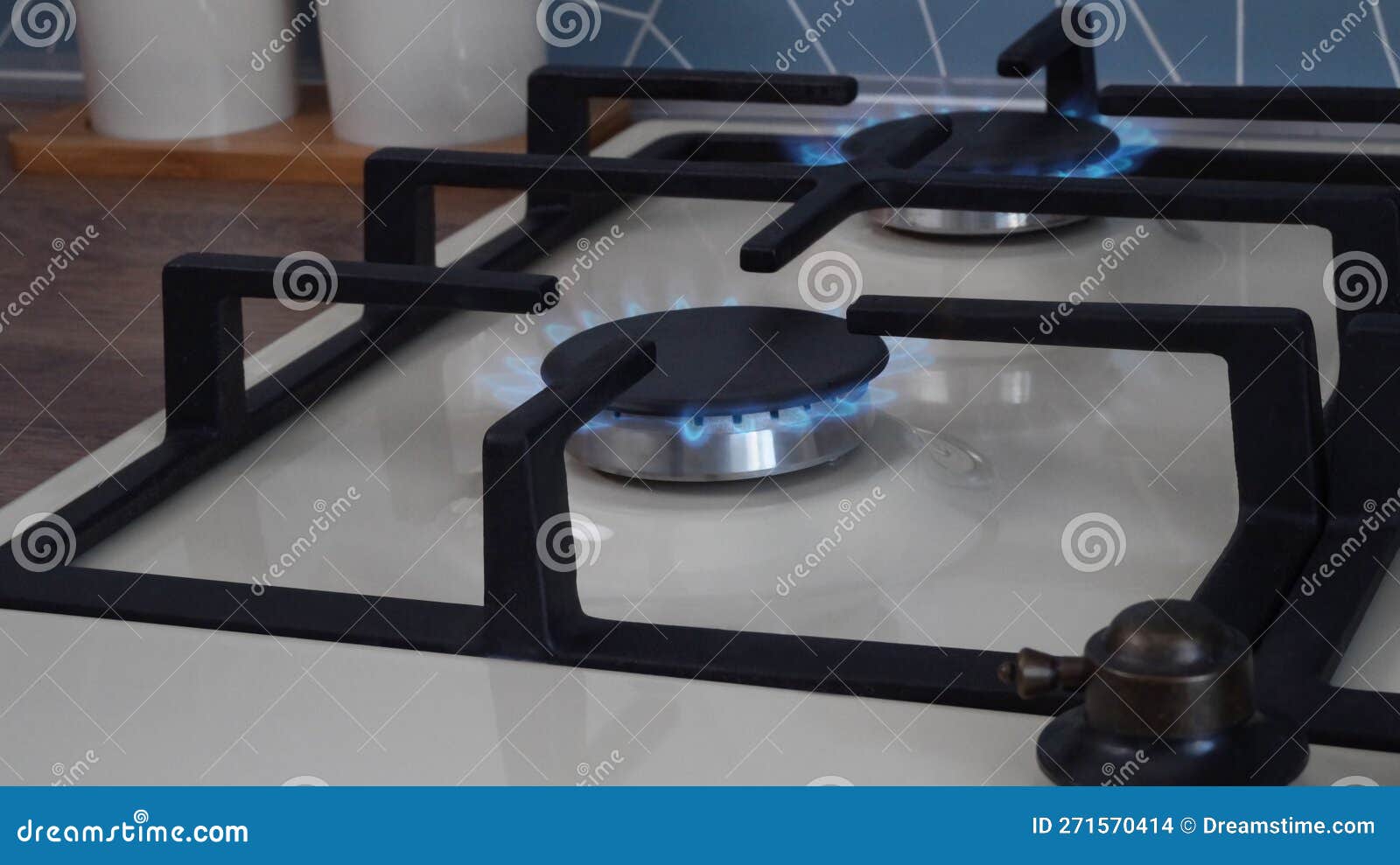 White Gas Cooktop with Turned on Burners in Kitchen Stock Photo - Image ...