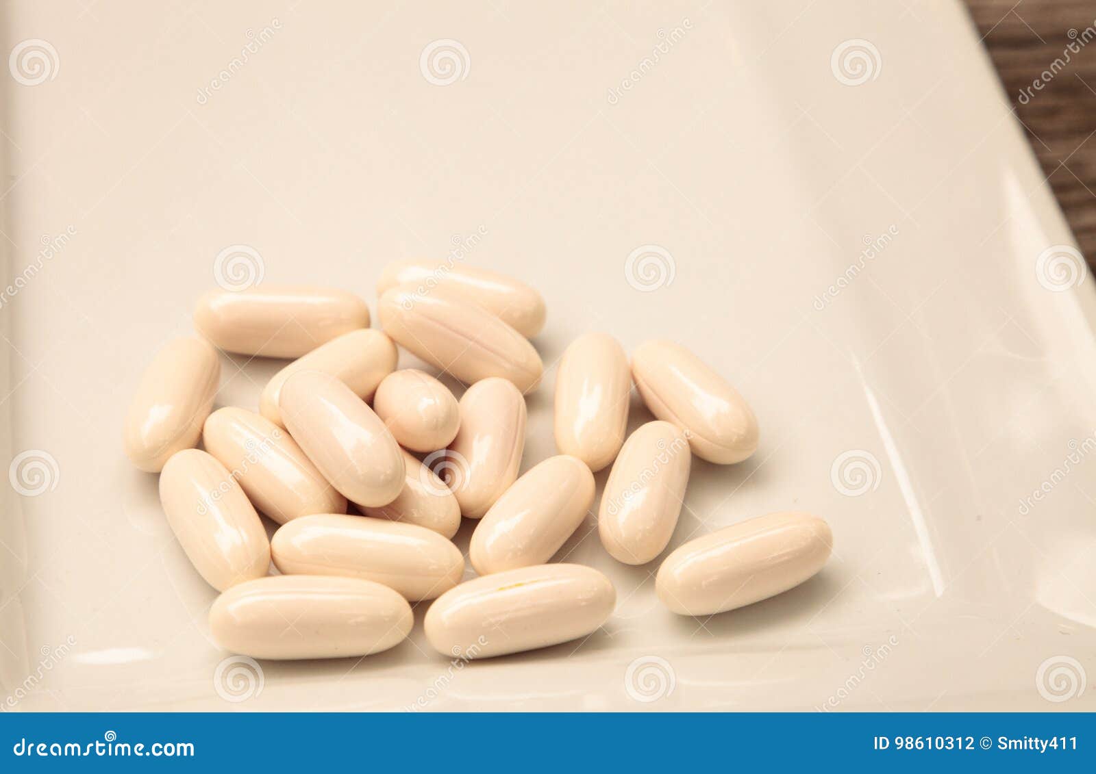 White Gel Capsules of Vitamin Co Q-10 Stock Photo - Image of ...