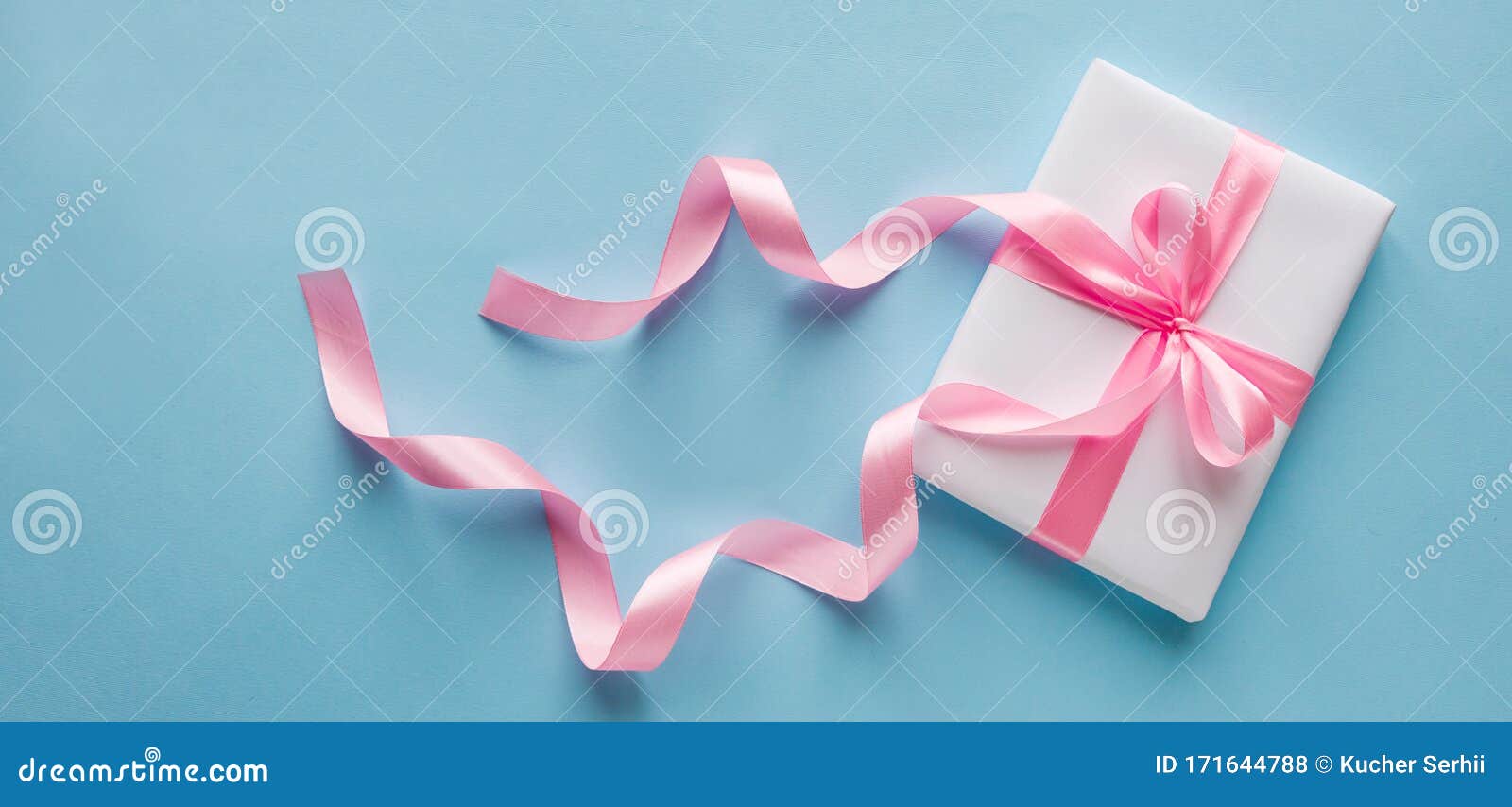White Gift Box with a Large Beautiful Pink Bow. Place for Text Stock ...
