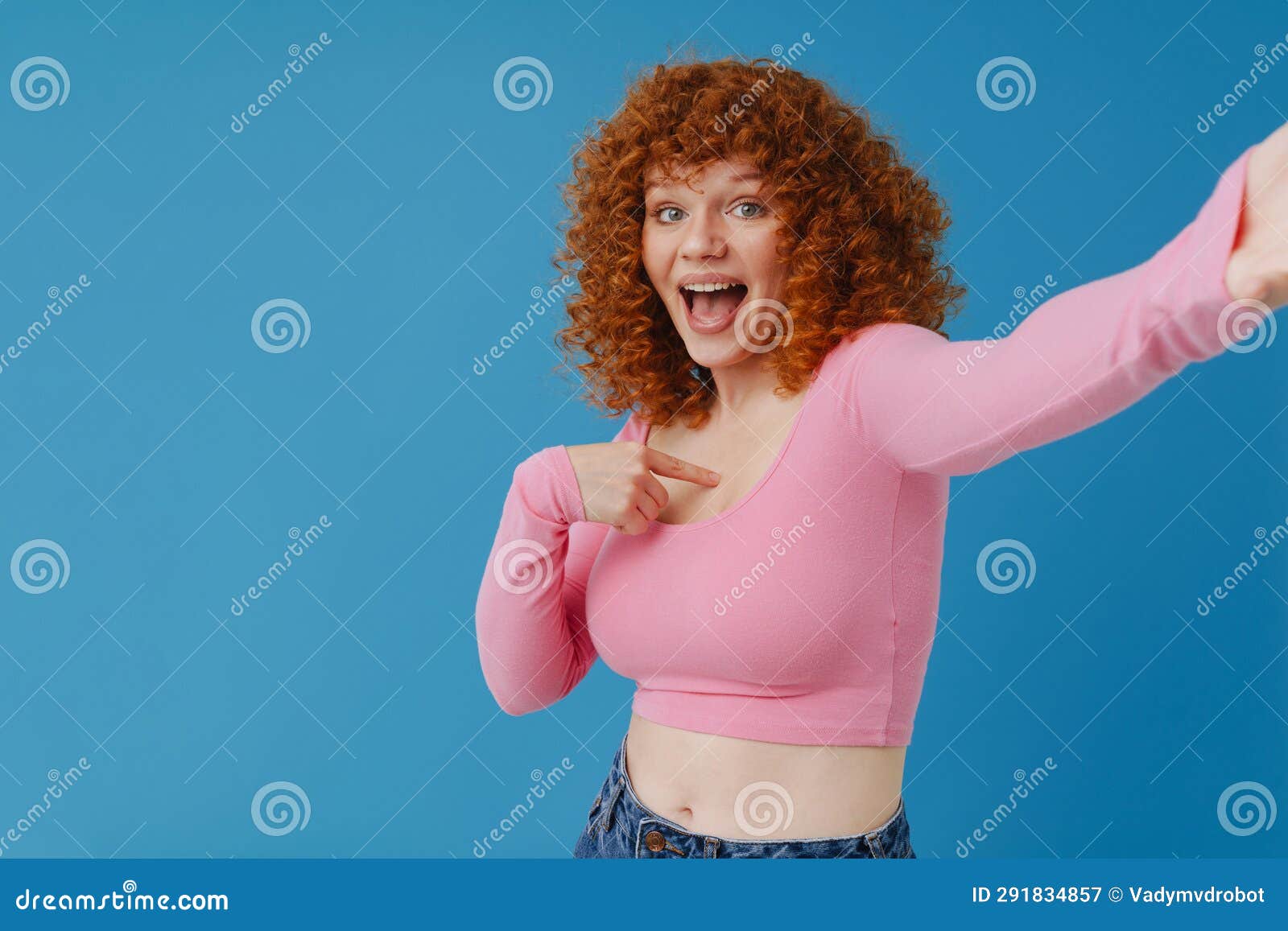 White Ginger Woman Pointing Finger At Herself While Taking Selfie Photo
