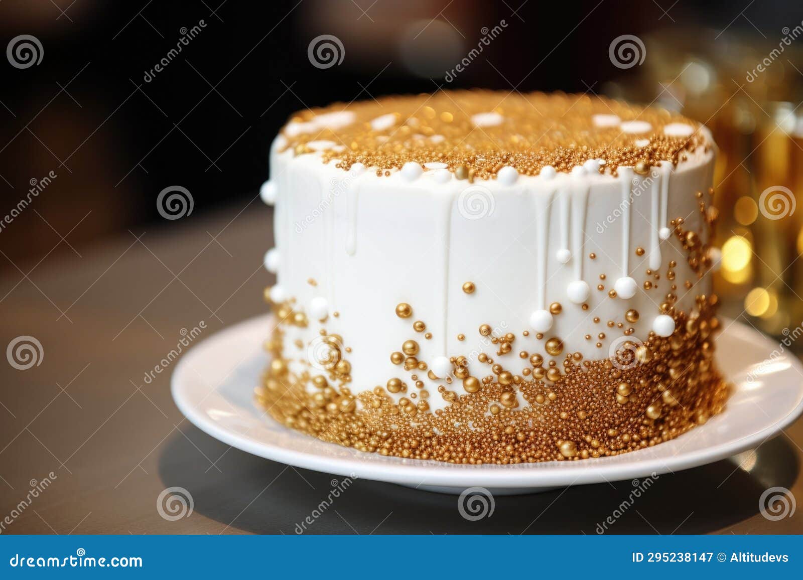 A White and Gold Cake with Dazzling Edible Pearls Stock Image - Image ...