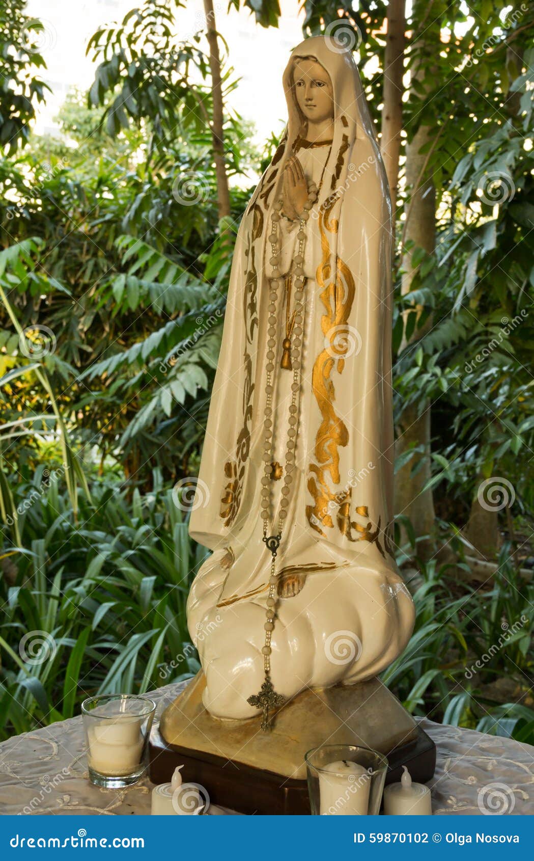 White and Gold Statue of Maria in the Park Stock Photo - Image of ...