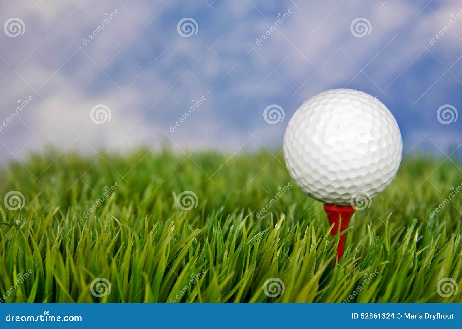 White golf ball on red tee stock photo. Image of grass - 52861324