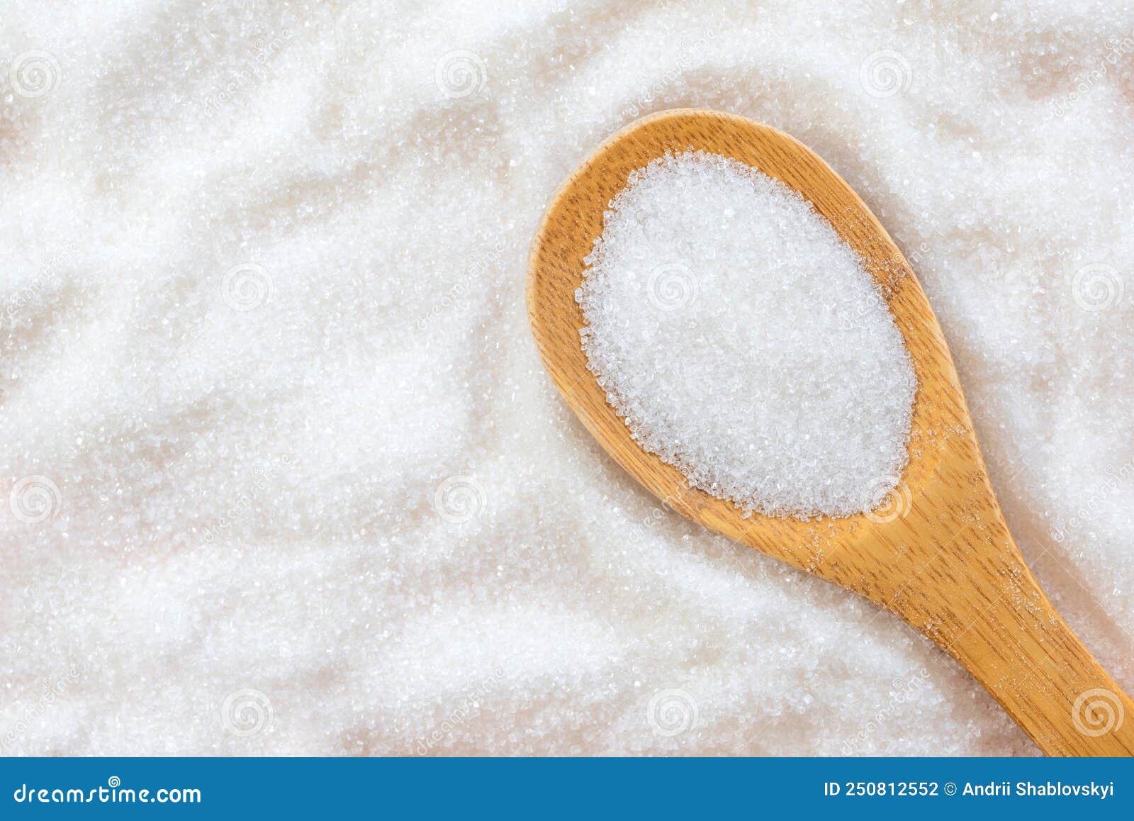 White Granulated Sugar and a Wooden Spoon in Sugar. Top View Stock ...