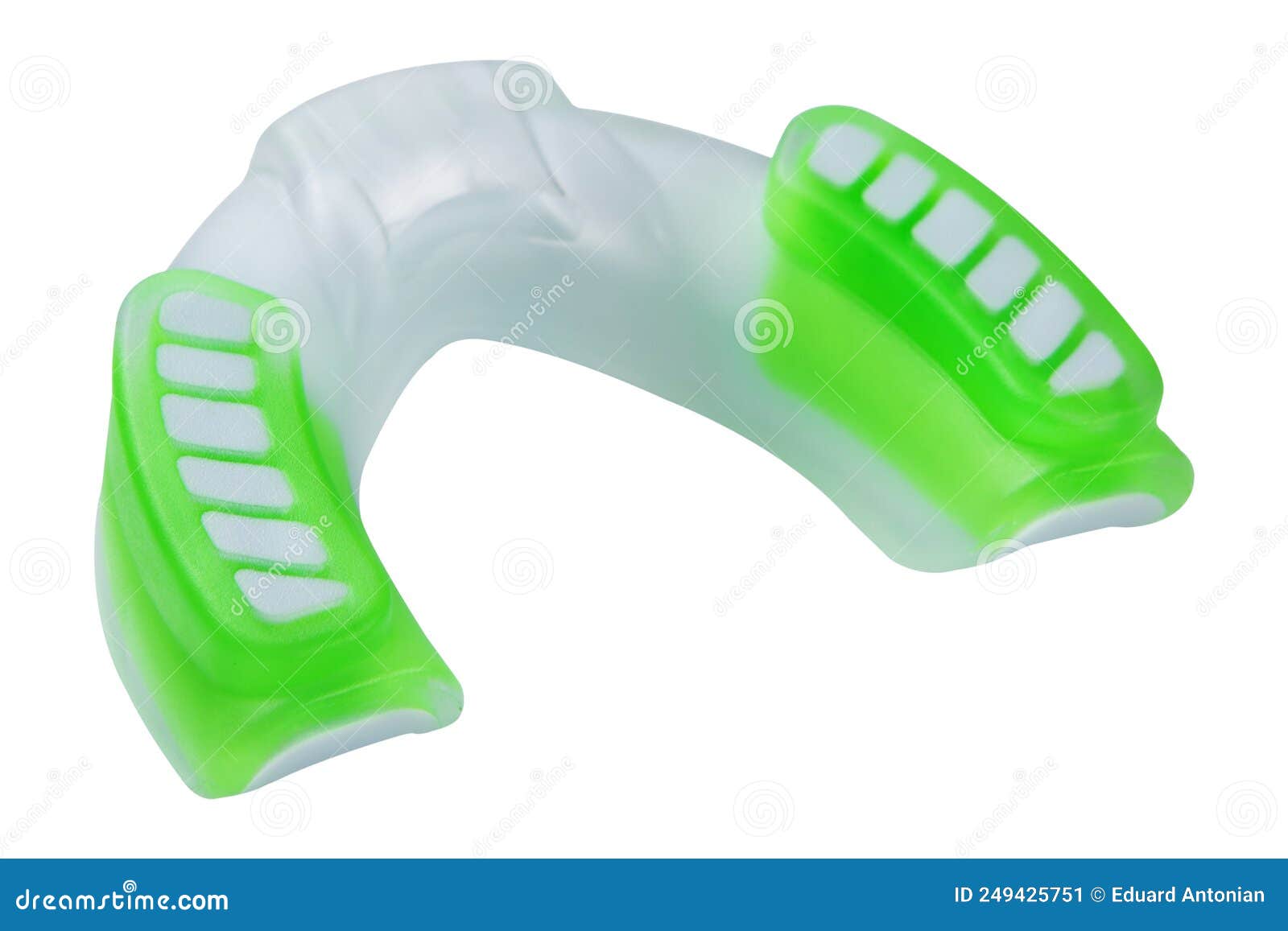 White with Green Inserts Silicone Mouthguard for One Jaw, Lies on the ...
