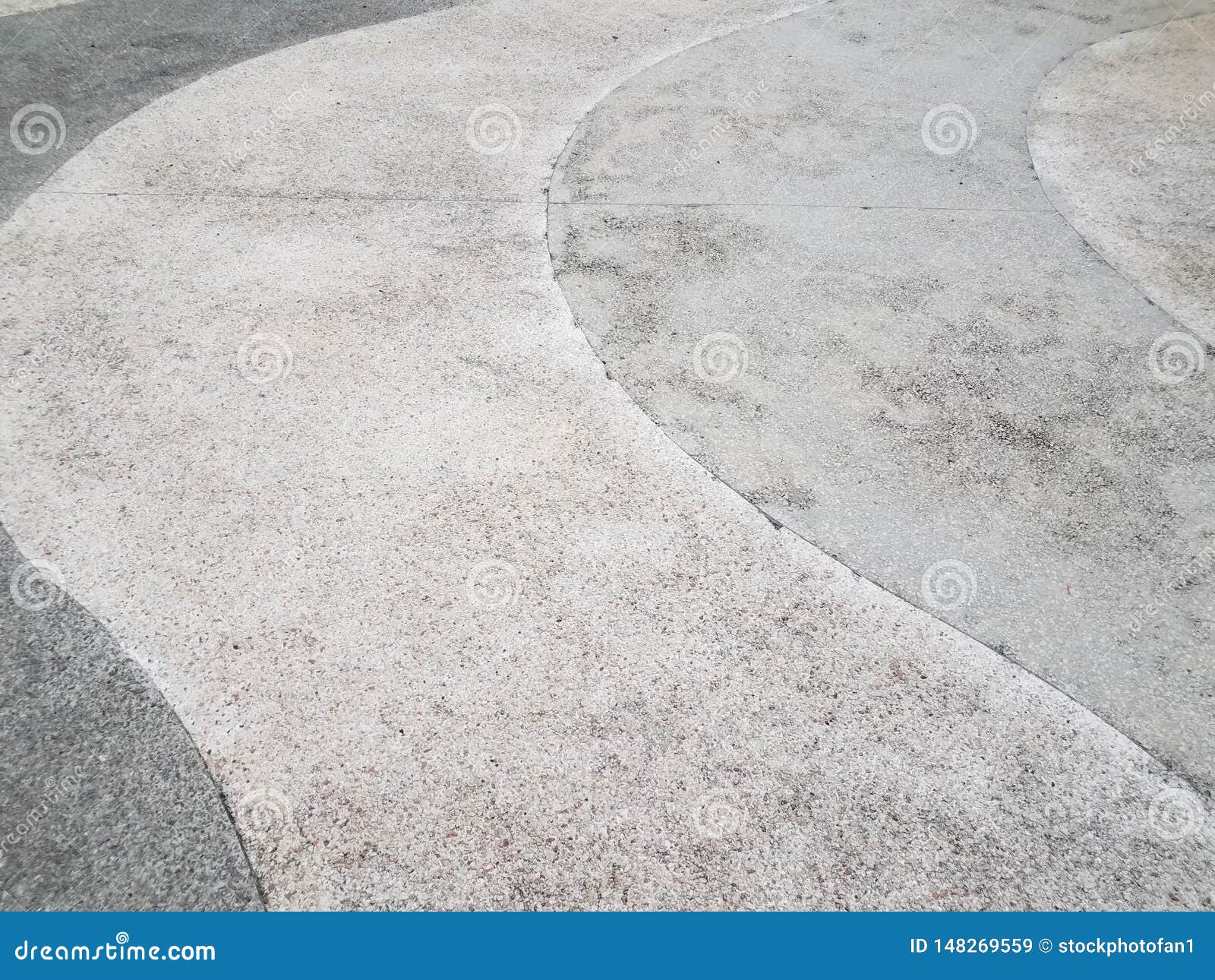 A Curved Cement Bricks Walkway With Green Fence Background For Exterior ...