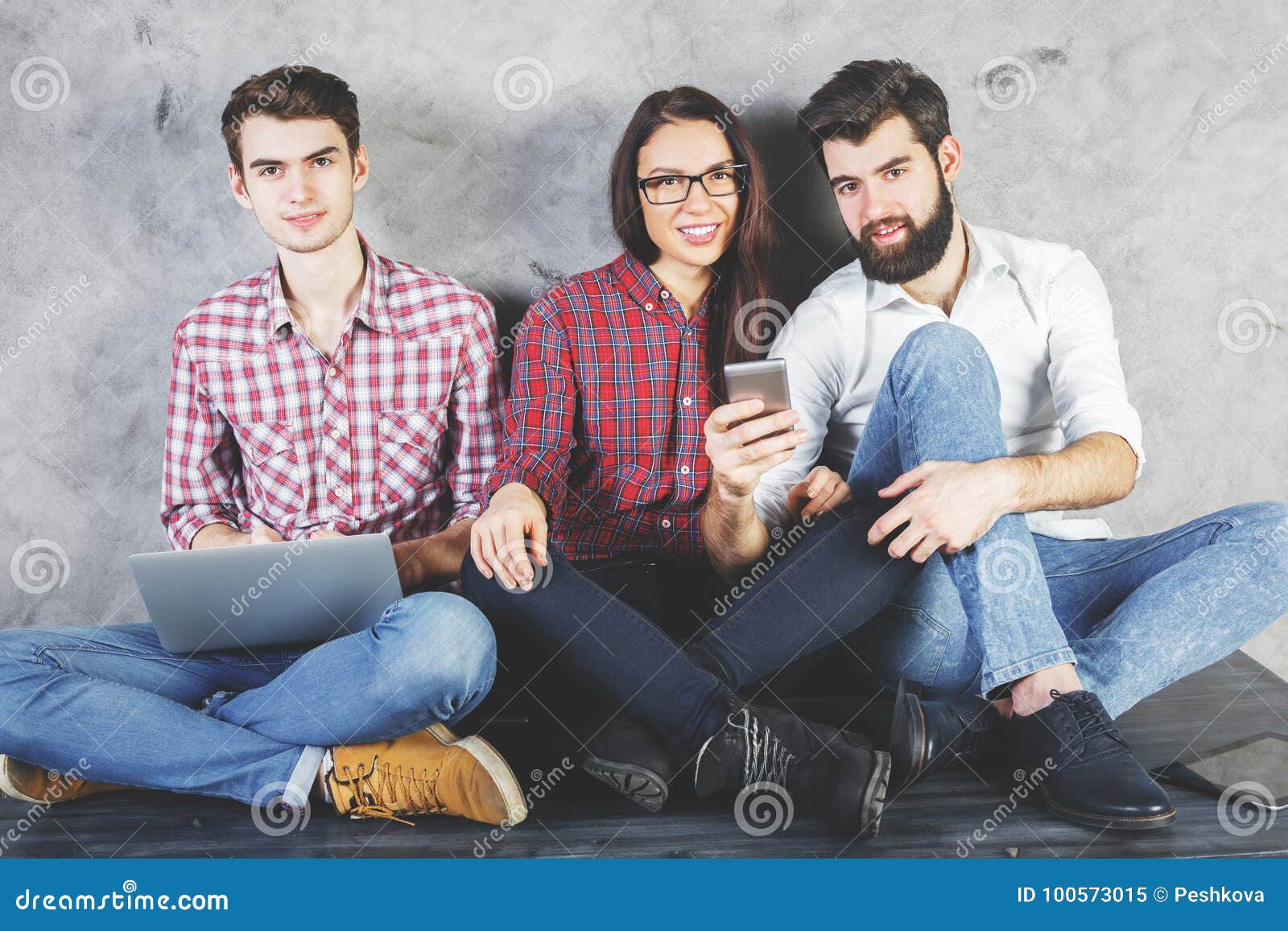 White group using devices stock image. Image of floor - 100573015