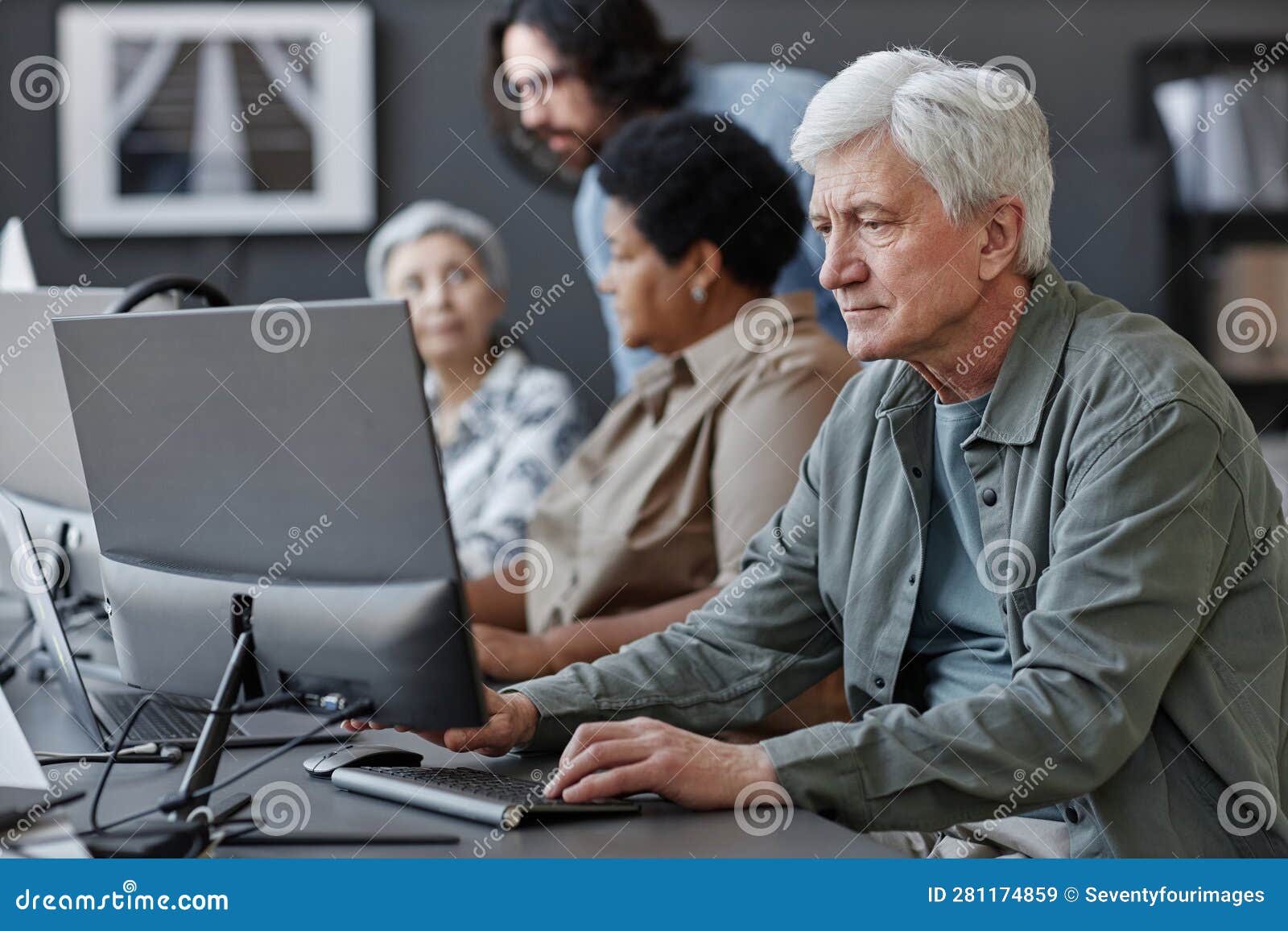 White Haired Senior Man Using Computer in Tech School for Elderly ...