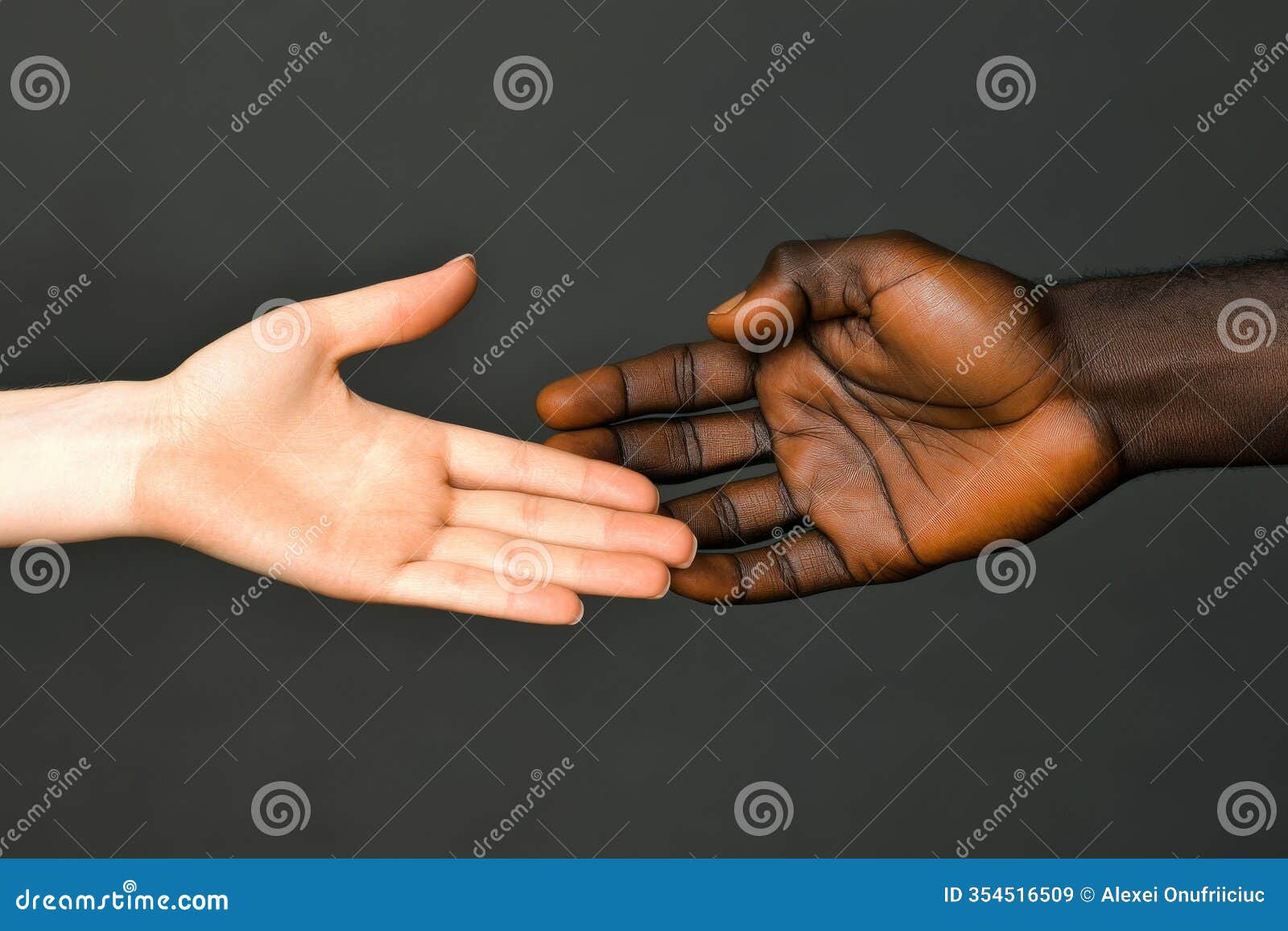 A White Hand is Reaching Out To Connect with a Black Hand Stock Image ...
