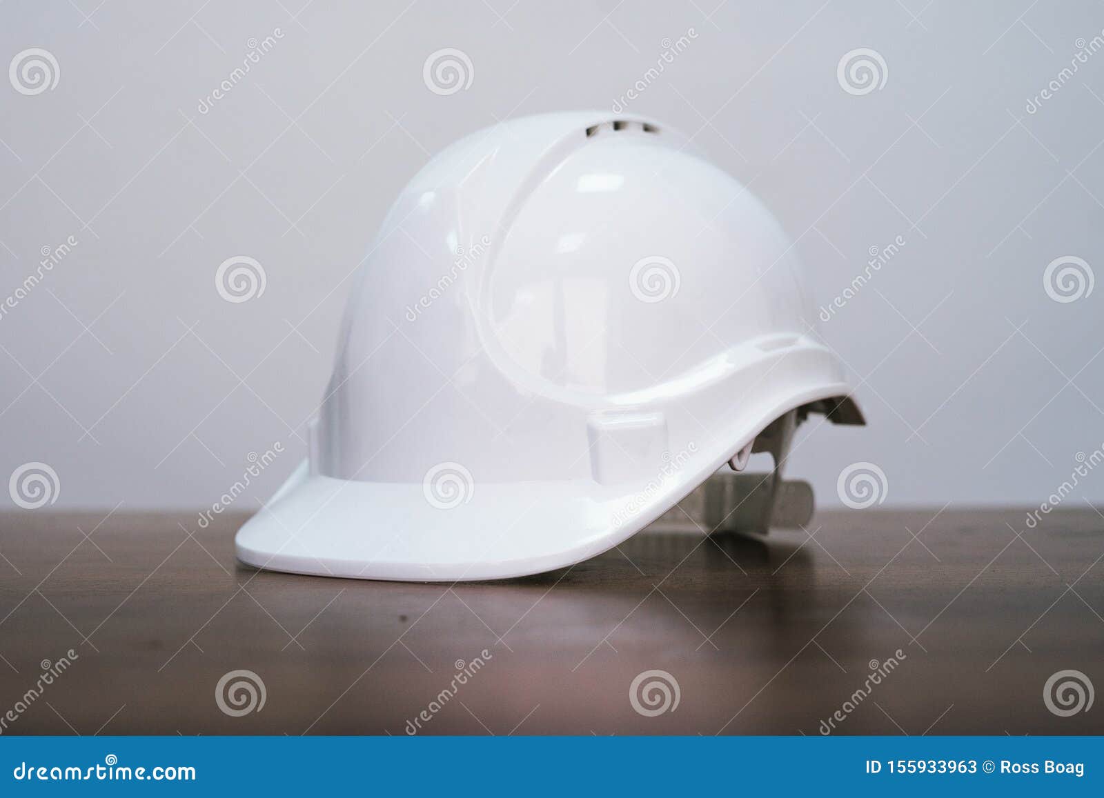 White Hard Hat on Table with White Background Stock Image - Image of ...